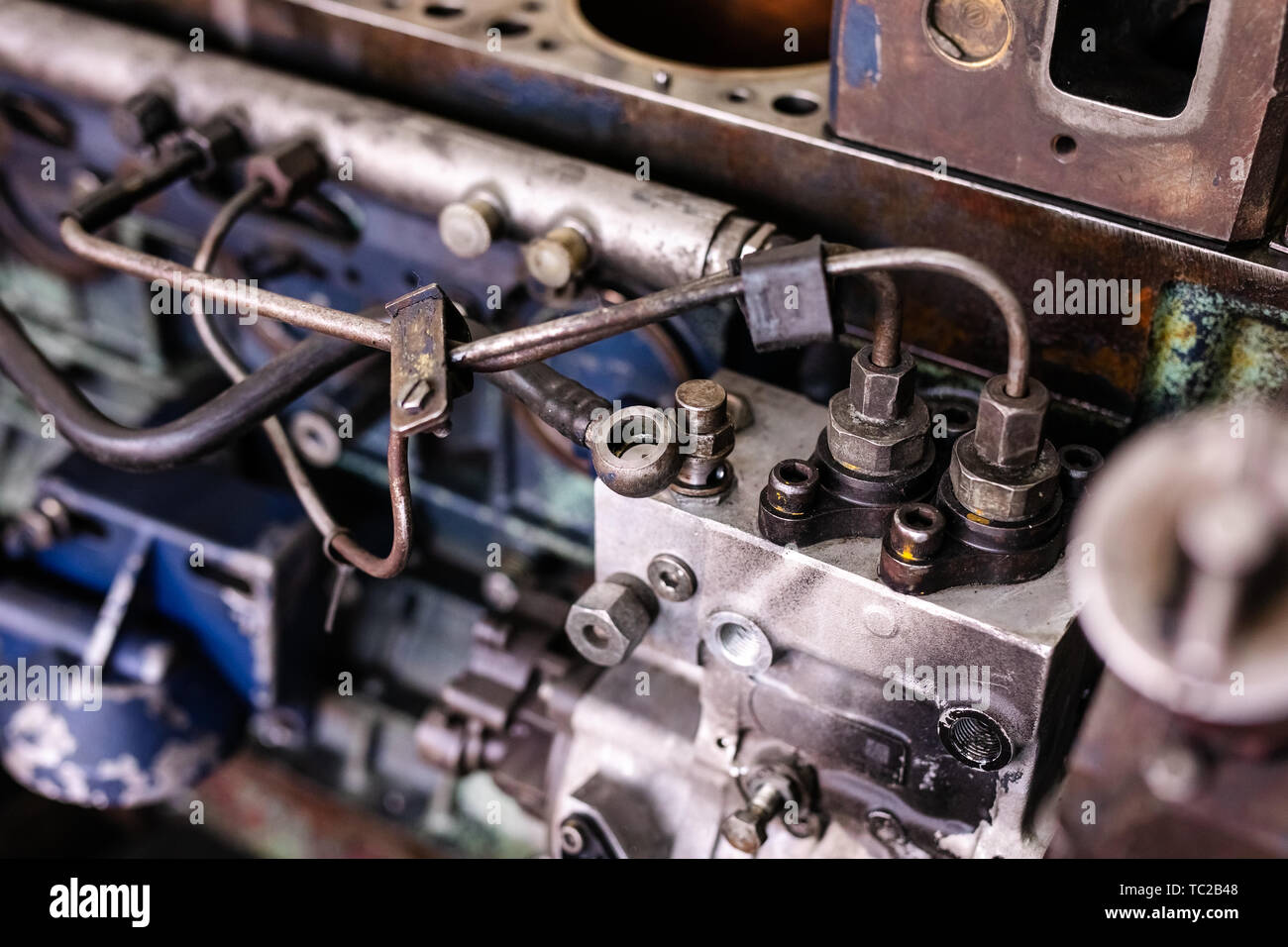 Mechanic opened the locking valve mechanism. Disassemble engine block ...