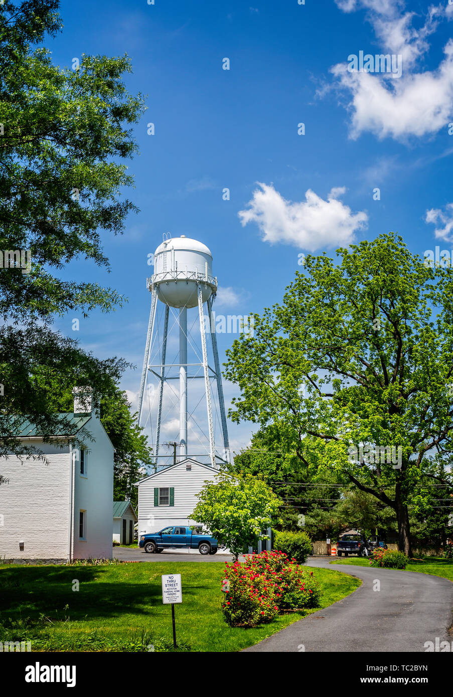 Tall white water tower in residential of Middleburg, Virginia, USA on ...
