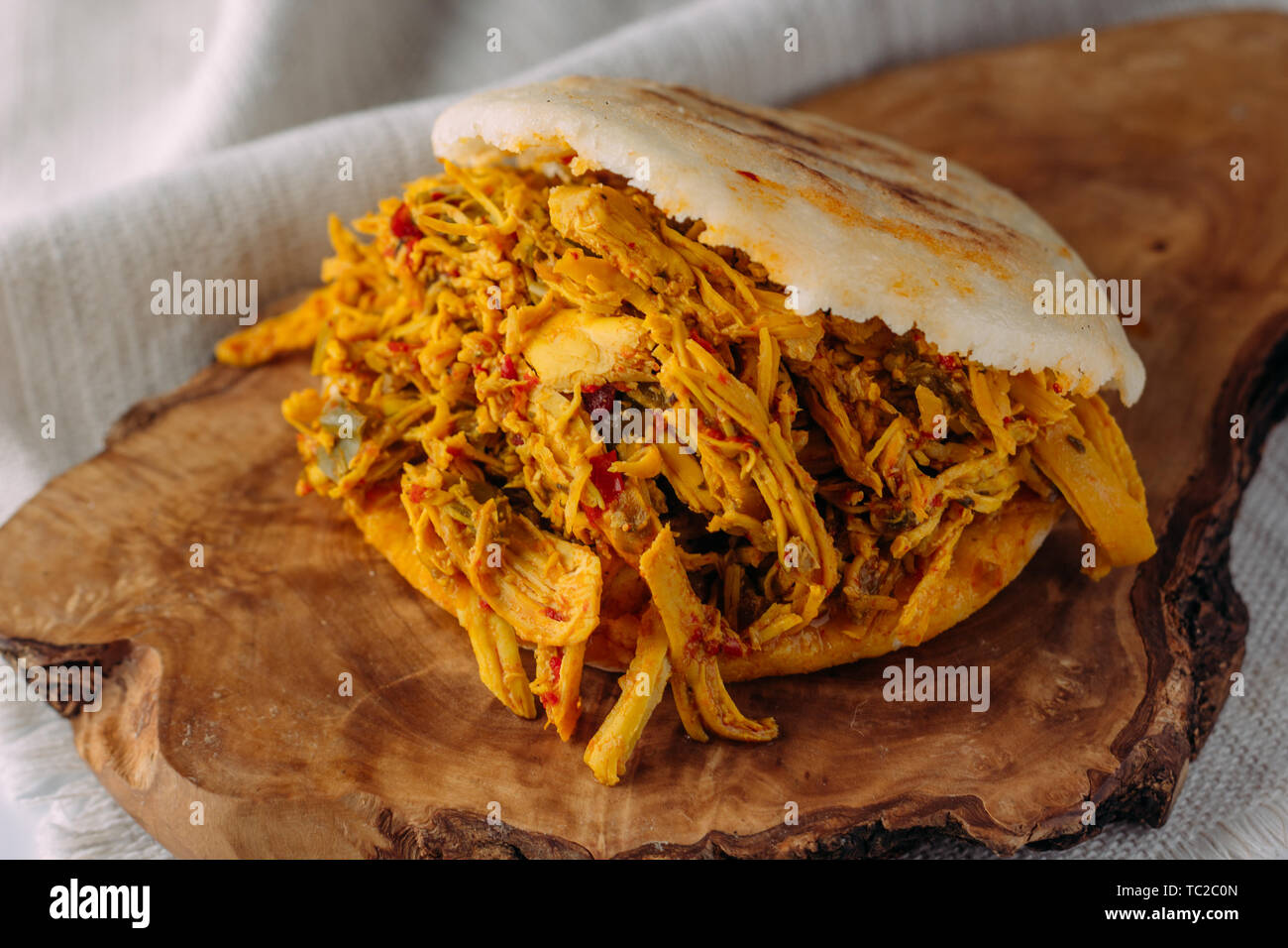 Typical Colombian dish for breakfast, roasted chicken arepa Stock Photo ...