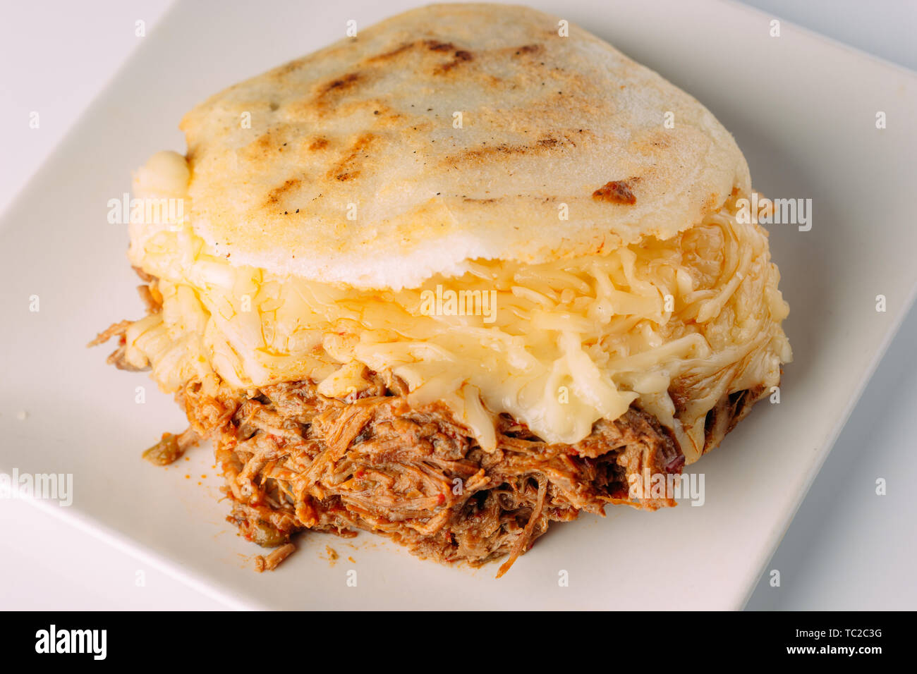 Arepas, South American food made from piled corn Stock Photo - Alamy