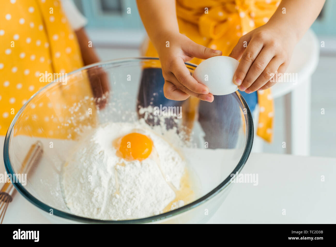 Child adding flour hi-res stock photography and images - Alamy
