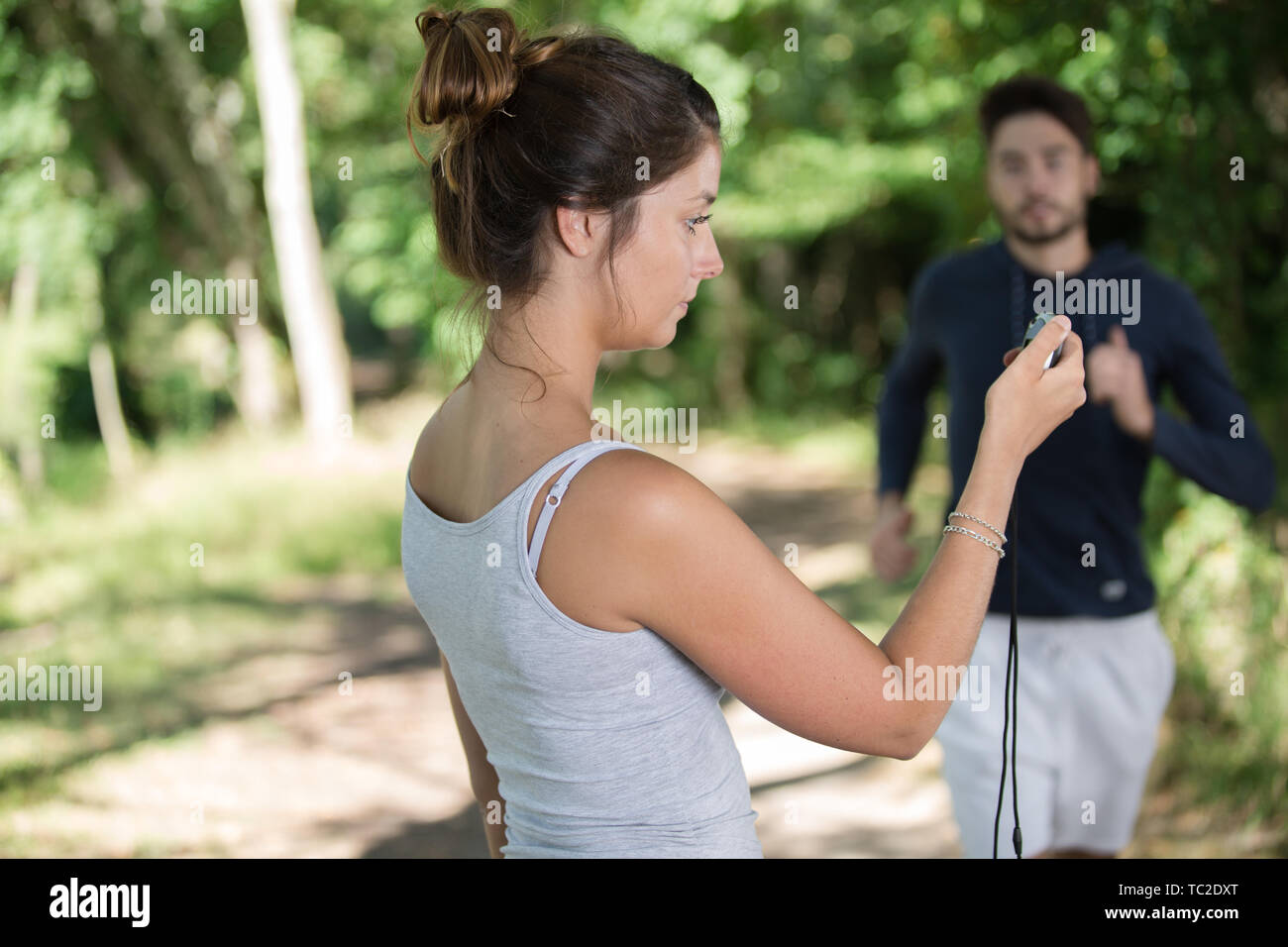 Runner timing hi-res stock photography and images - Alamy