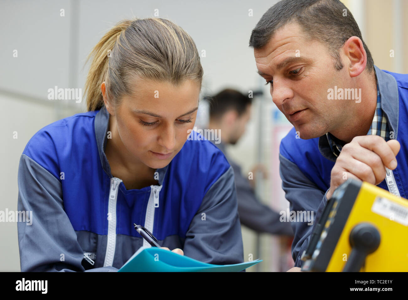 team of young female and male engineers working on projects Stock Photo ...