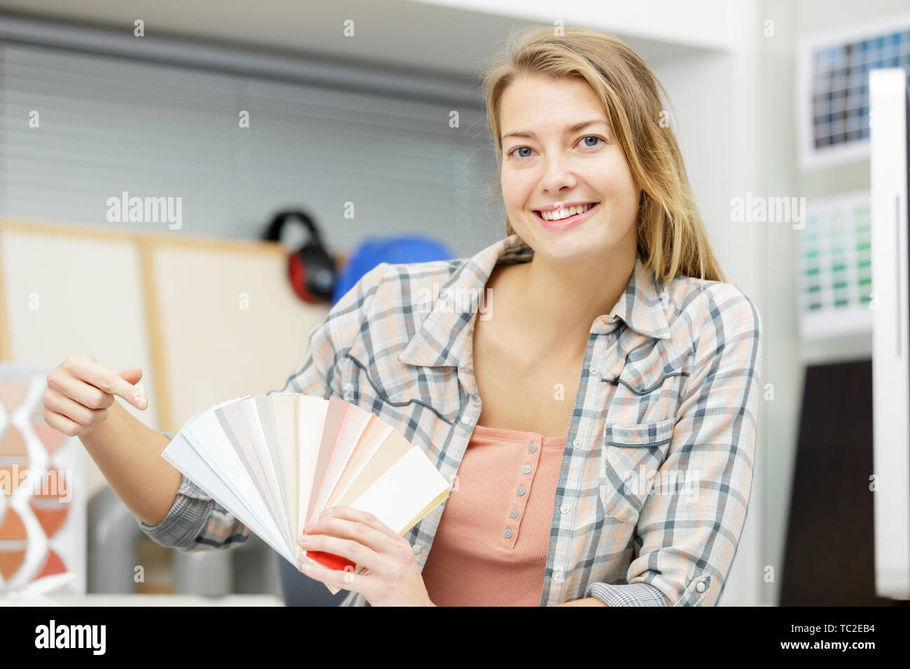 interior design holding color swatches at workplace Stock Photo - Alamy