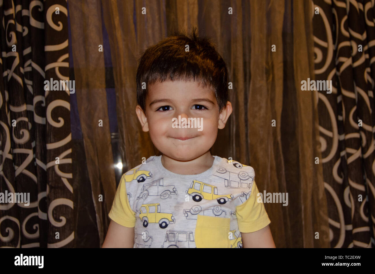 cute two years old boy making funny faces early development concept ...