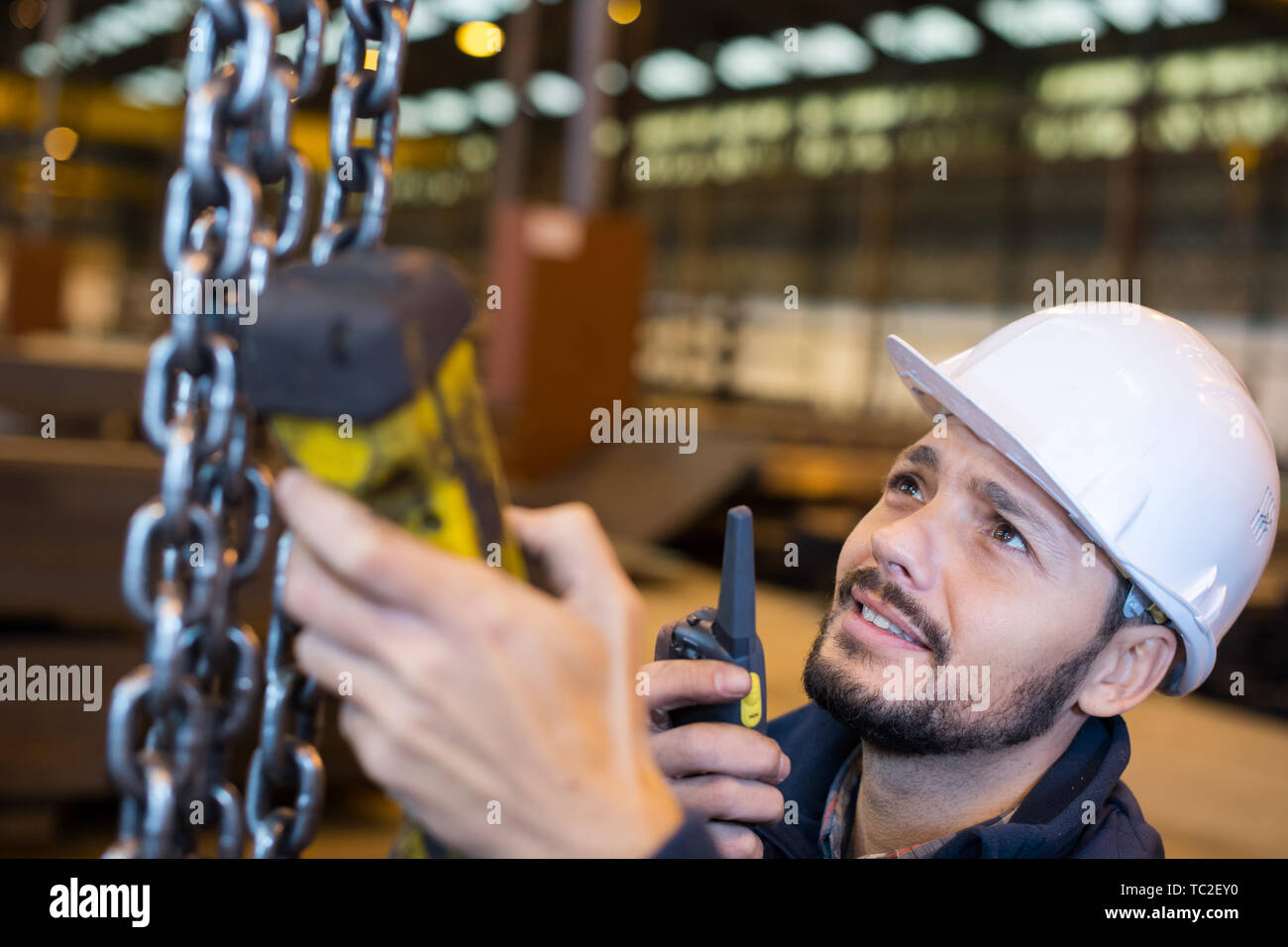 crane operator guide giving instructions Stock Photo - Alamy