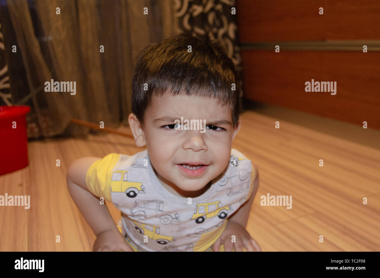 cute two years old boy making funny faces early development concept ...