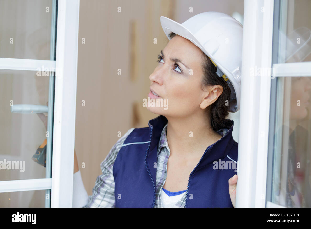 woman with workers hat Stock Photo - Alamy