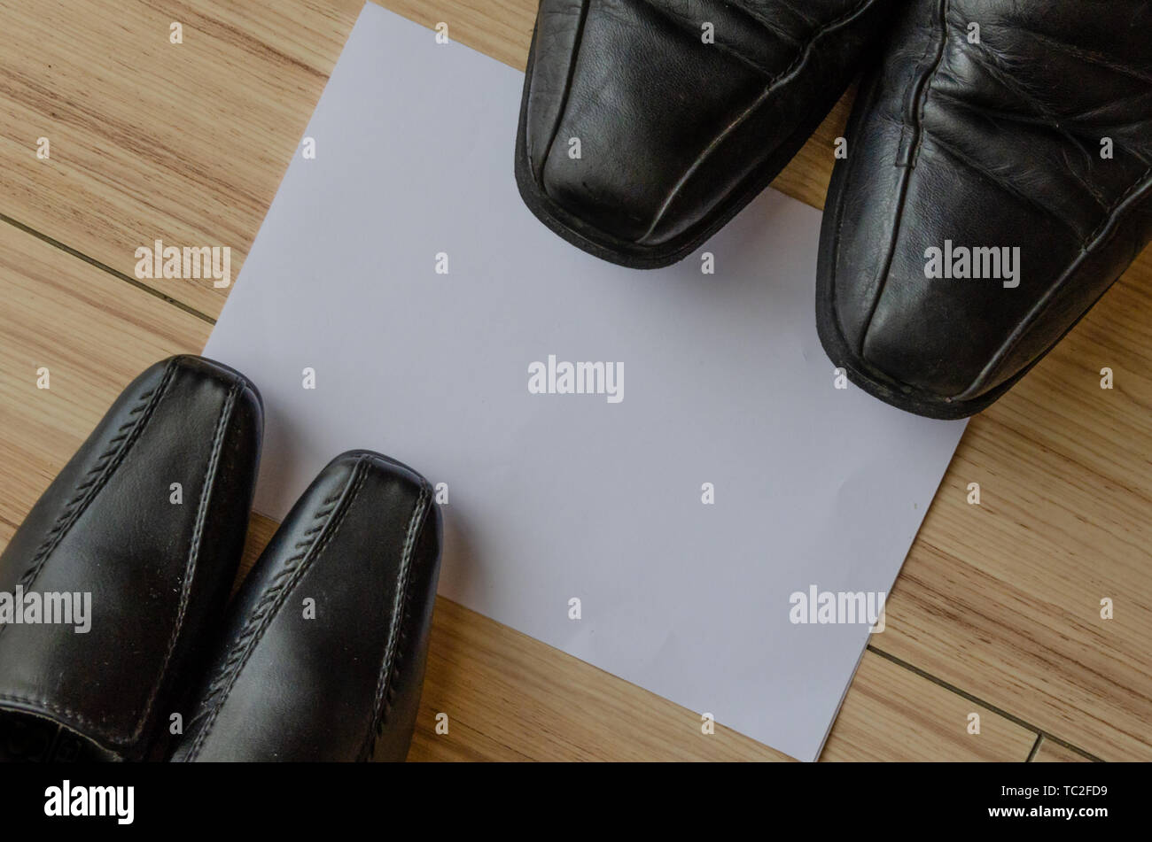 Happy fathers day, fathers shoes and baby boys shoes overhead, flat lay ...