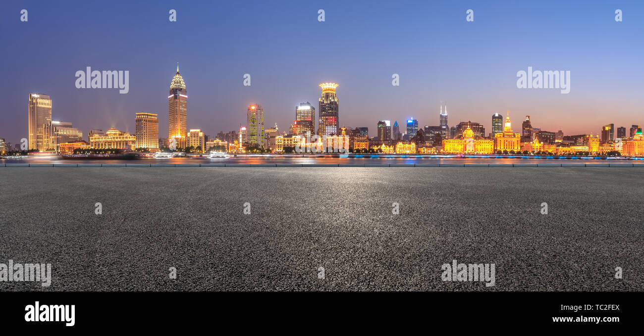 Shanghai bund city skyline and empty asphalt road ground at night Stock ...