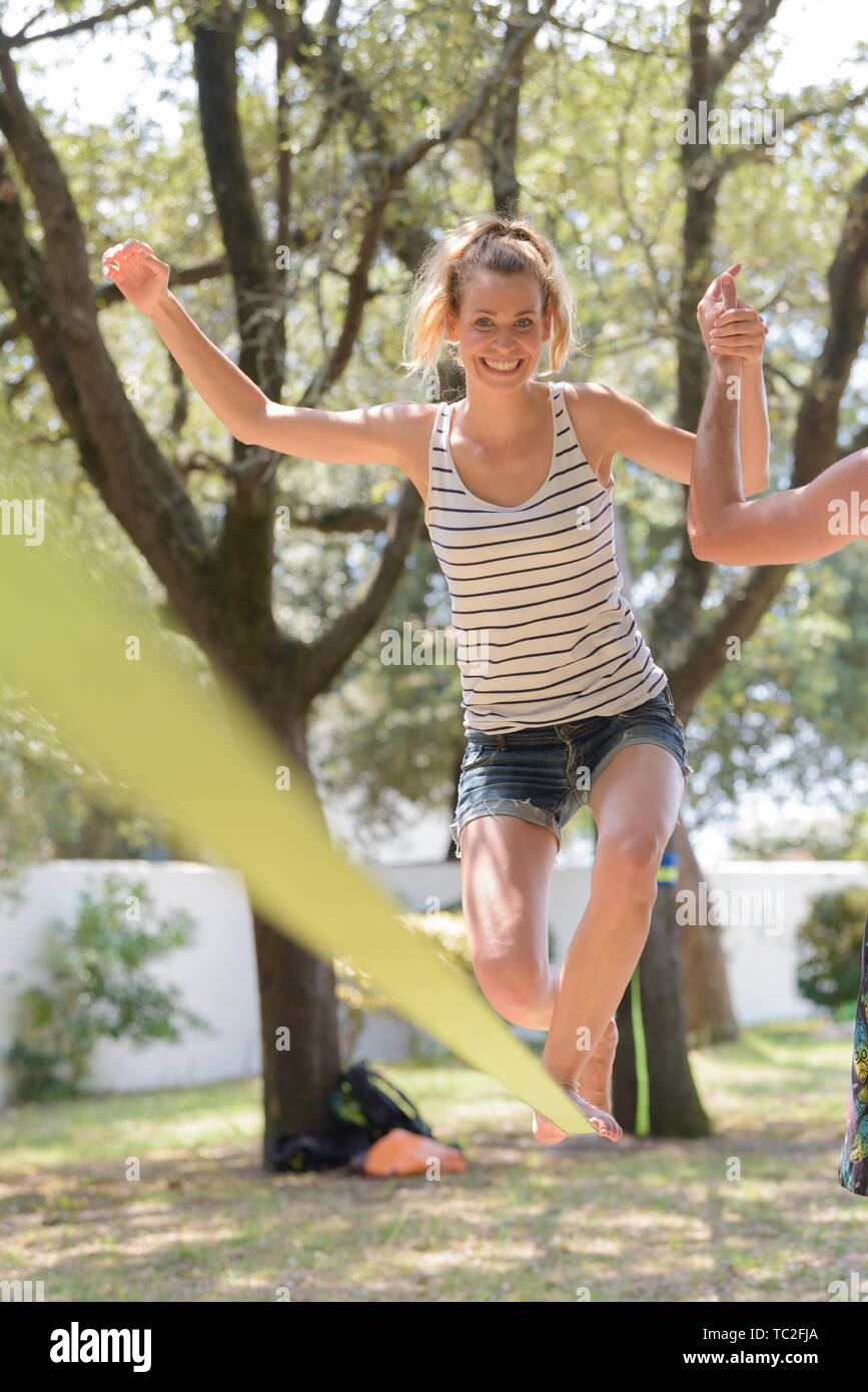 Slack line and female hi-res stock photography and images - Alamy