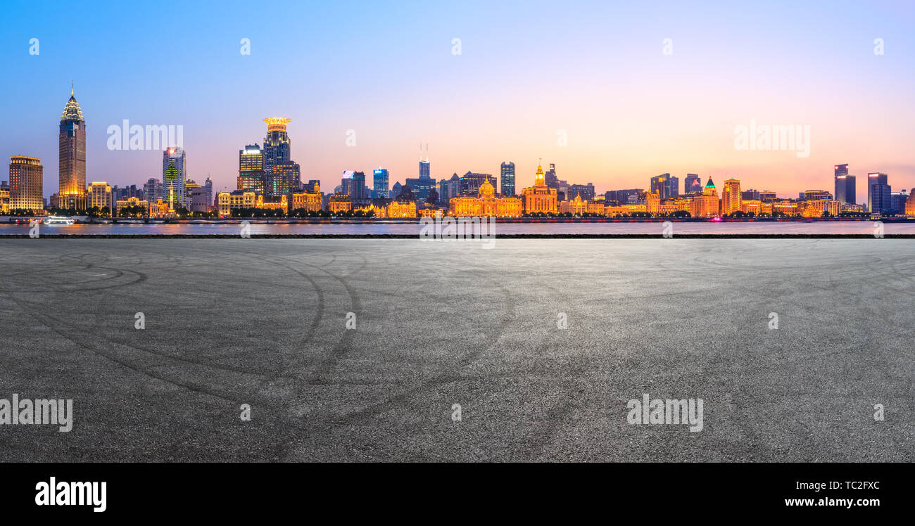 Shanghai bund city skyline and empty asphalt road ground at night Stock ...