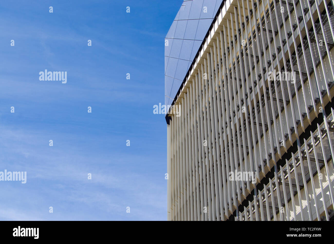 Bright Blue City Buildings With Clouds Stock Photo - Alamy