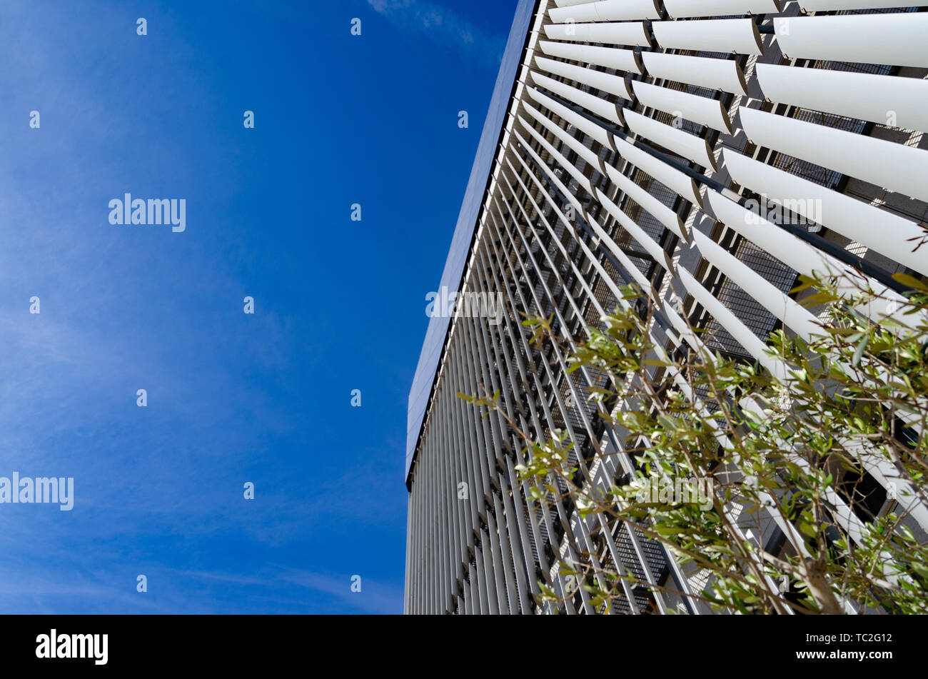 Bright Blue City Buildings With Clouds Stock Photo - Alamy