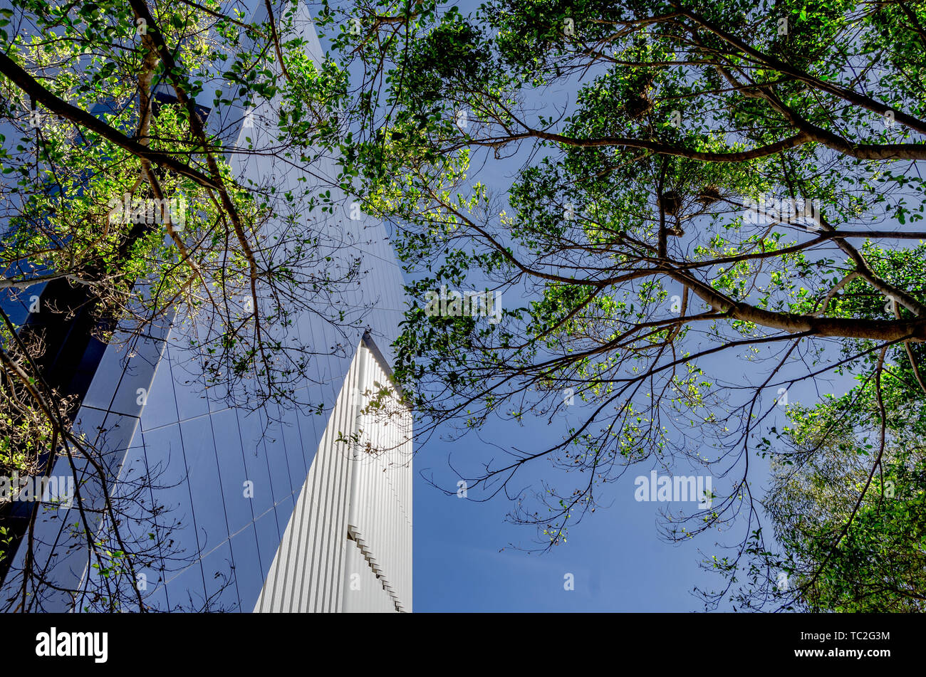 Bright Blue City Buildings With Clouds Stock Photo - Alamy