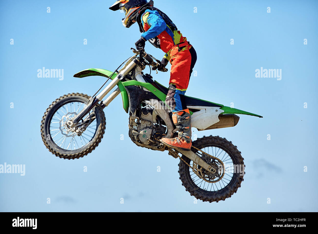 Extreme sports, motorcycle jumping. Motorcyclist makes an extreme jump ...