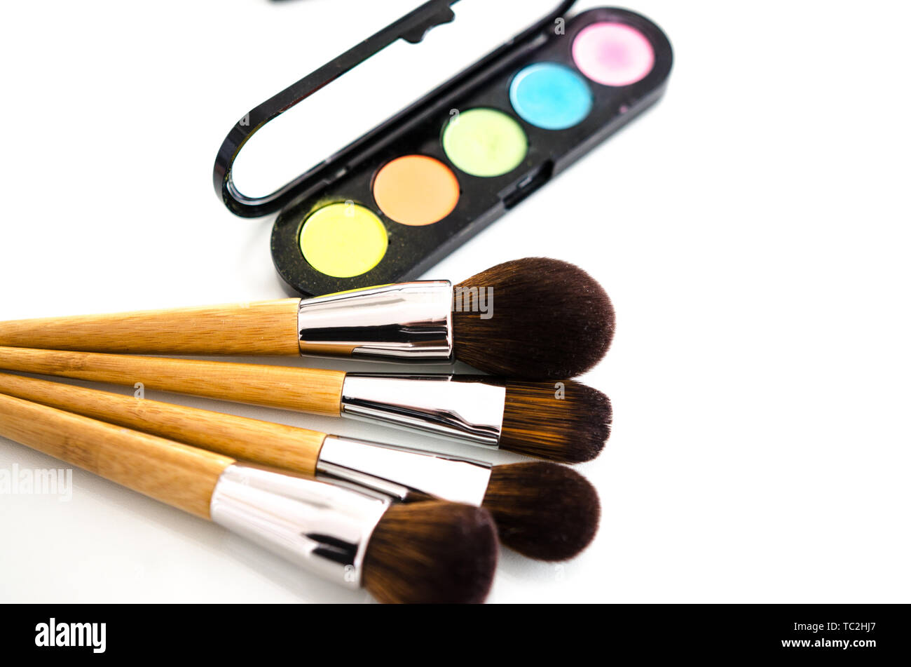 Makeup cosmetics on white background. Top view with copy space. Beauty ...