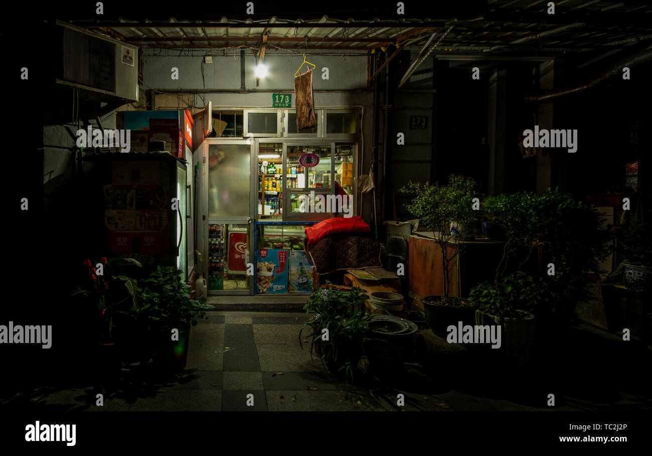 Traditional Shanghai grocery store at night Stock Photo - Alamy