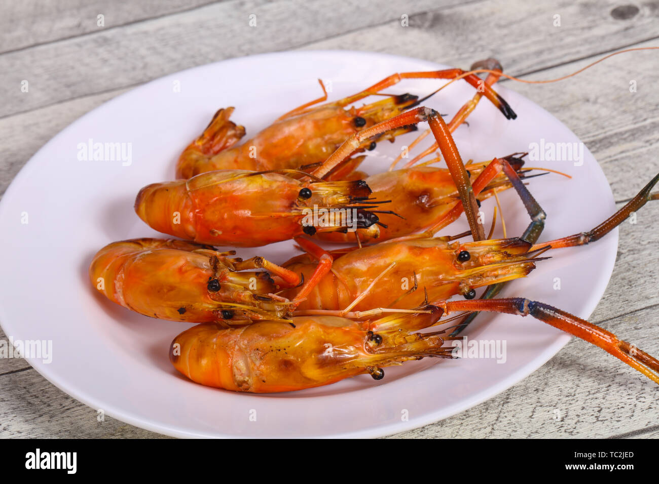 Grilled Asian water prawn in the plate Stock Photo - Alamy