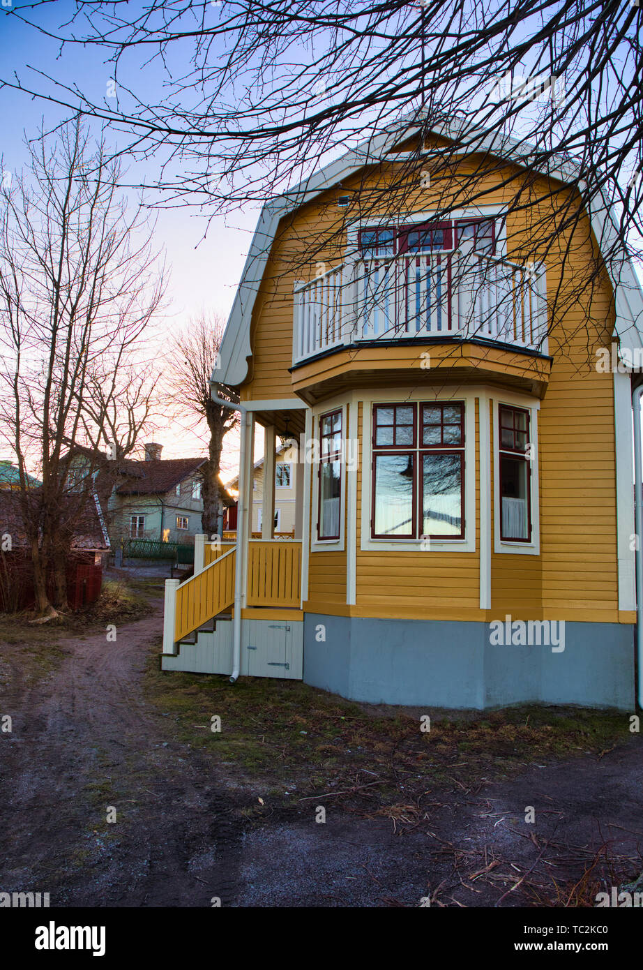 Yellow wooden house at sunset, Sandhamn island, Stockholm archipelago ...