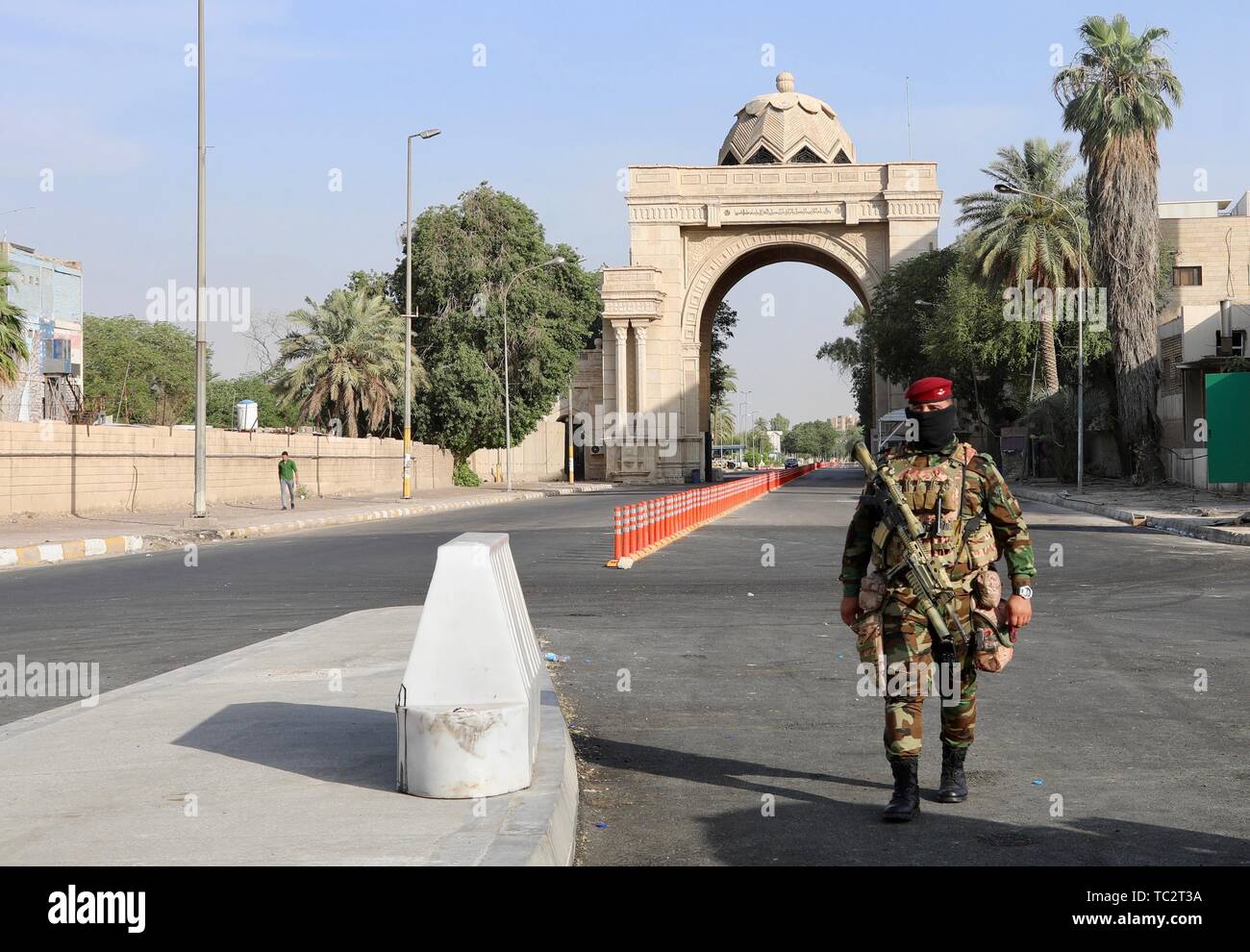 Baghdad, Iraq. 4th June, 2019. A security member guards an entrance to ...