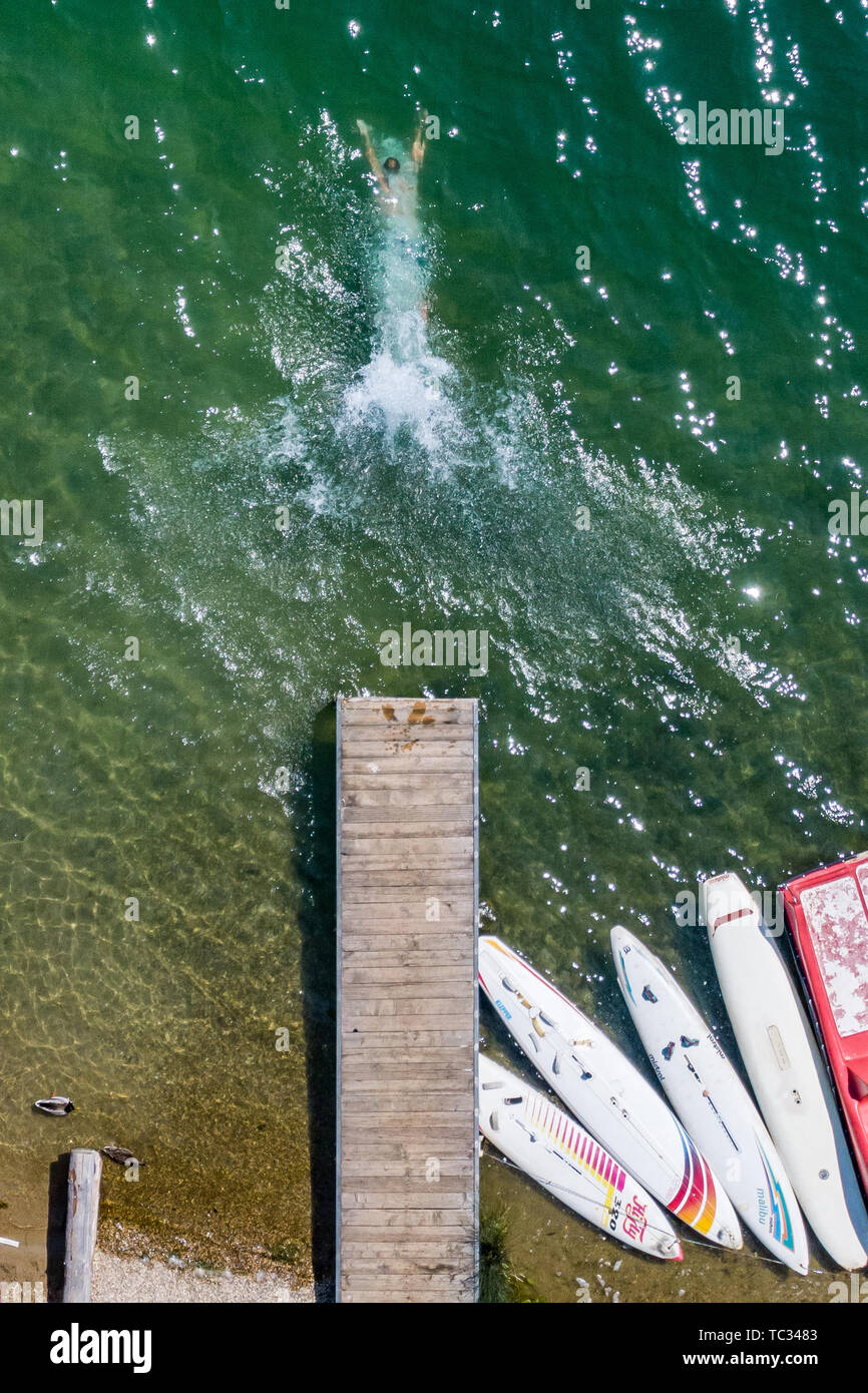 Neutraubling, Germany. 14th Sep, 2017. A man jumps from a footbridge ...