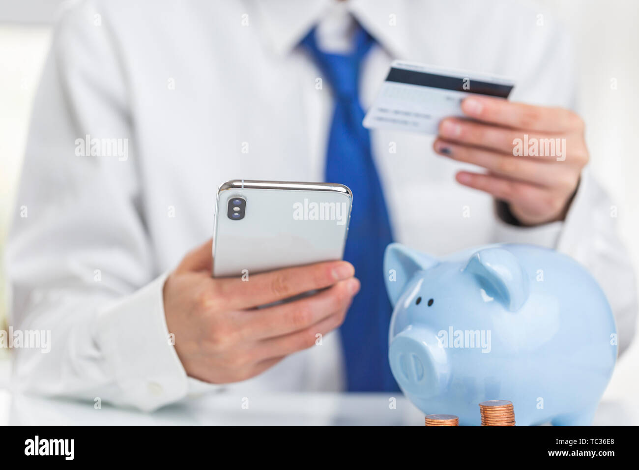 Mobile phone finance Stock Photo - Alamy