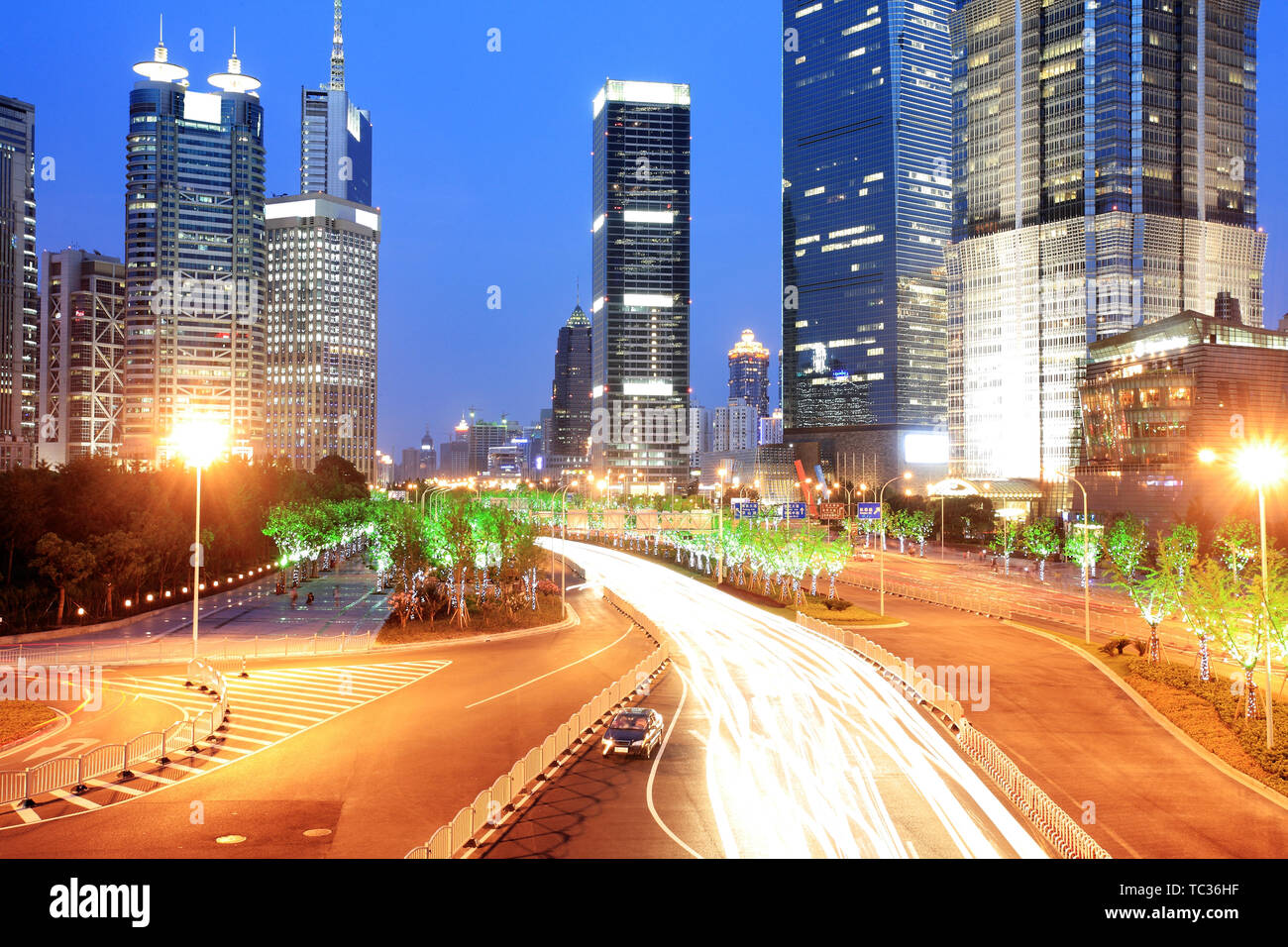 the light trails on the modern building background in shanghai c Stock ...
