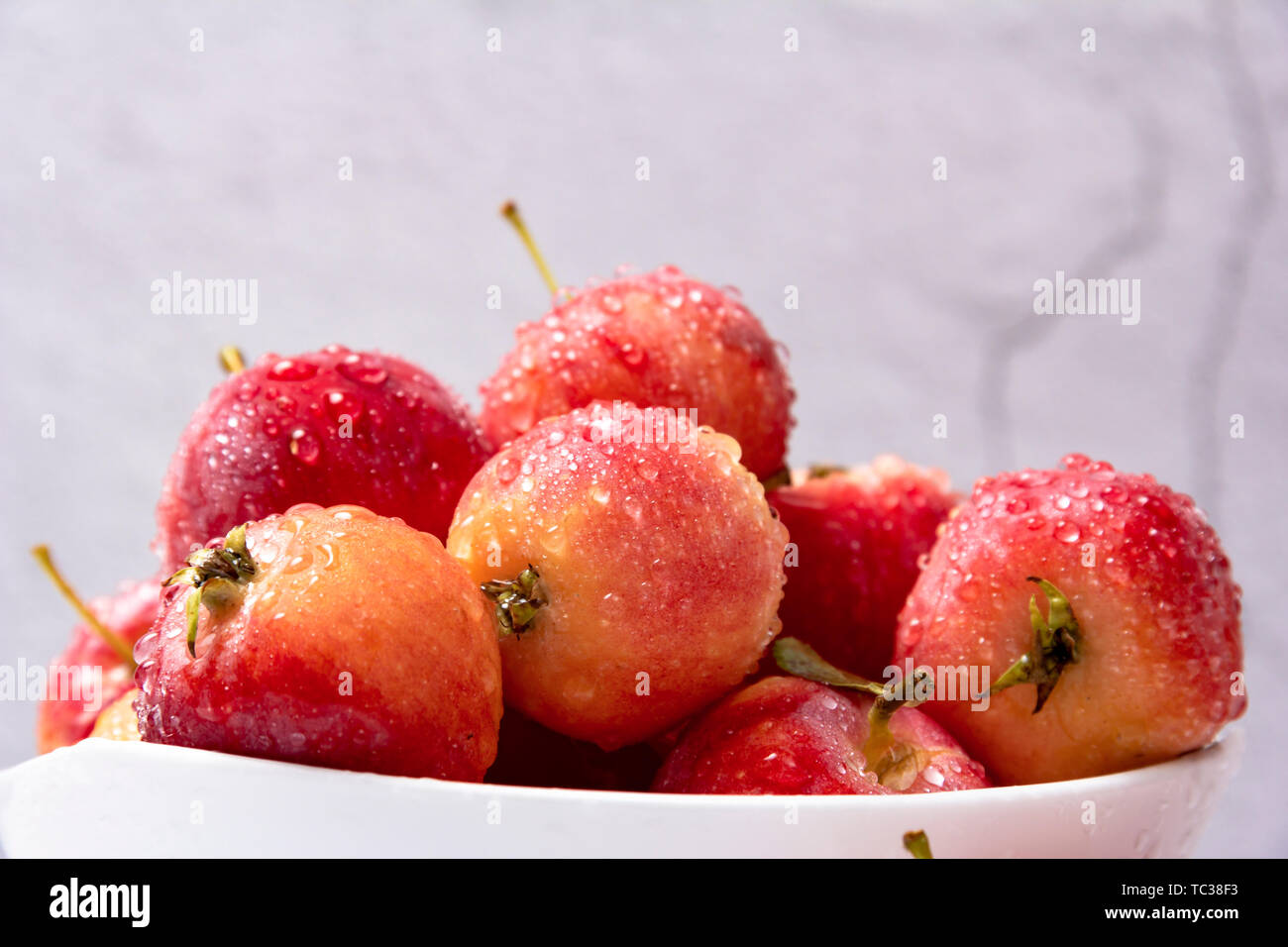 Fresh sand dripping with beads of water Stock Photo - Alamy