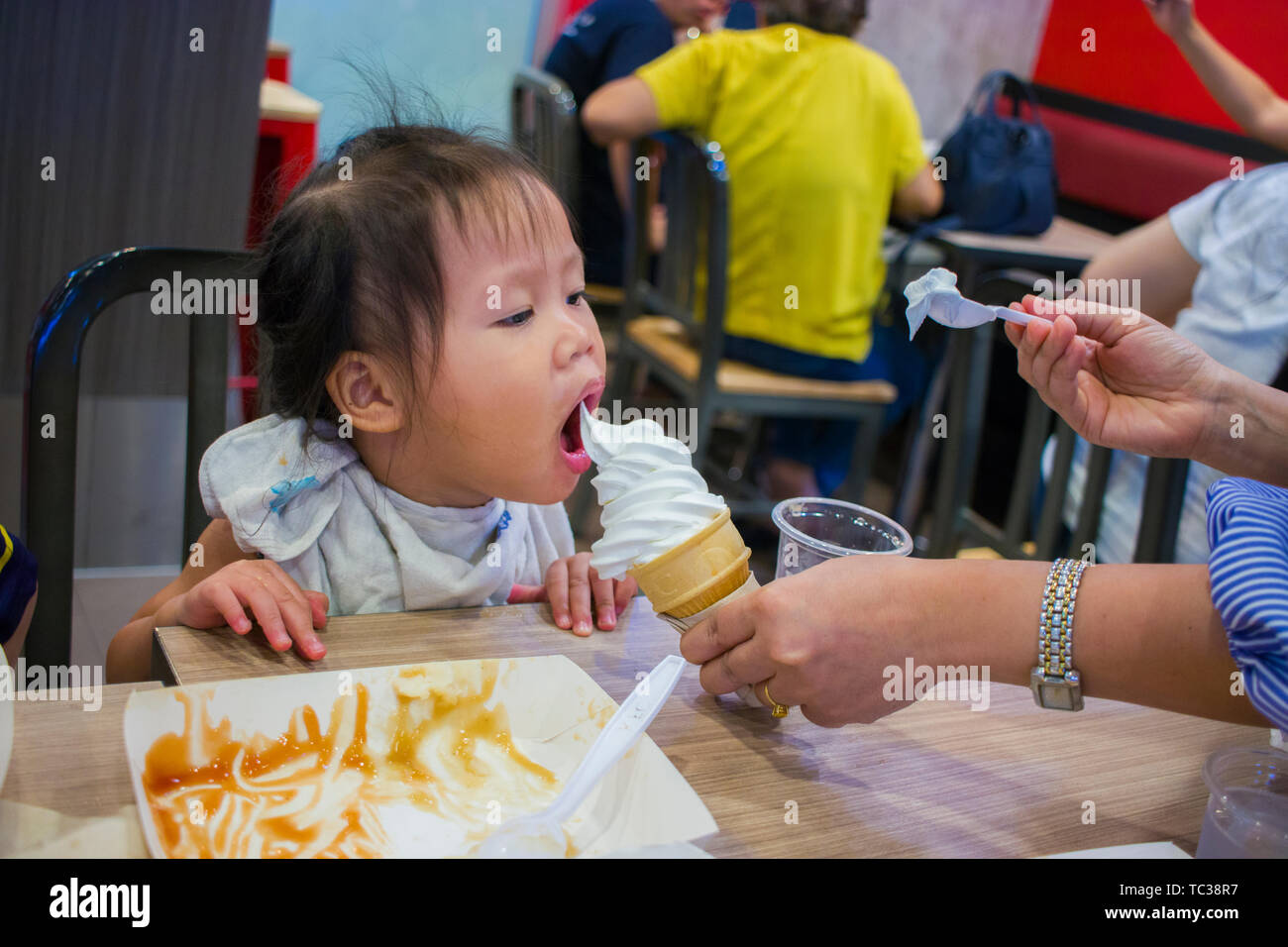 CHIANGMAI,THAILAND-MAY 3,2019 : Little Child eating ice scream in the ...