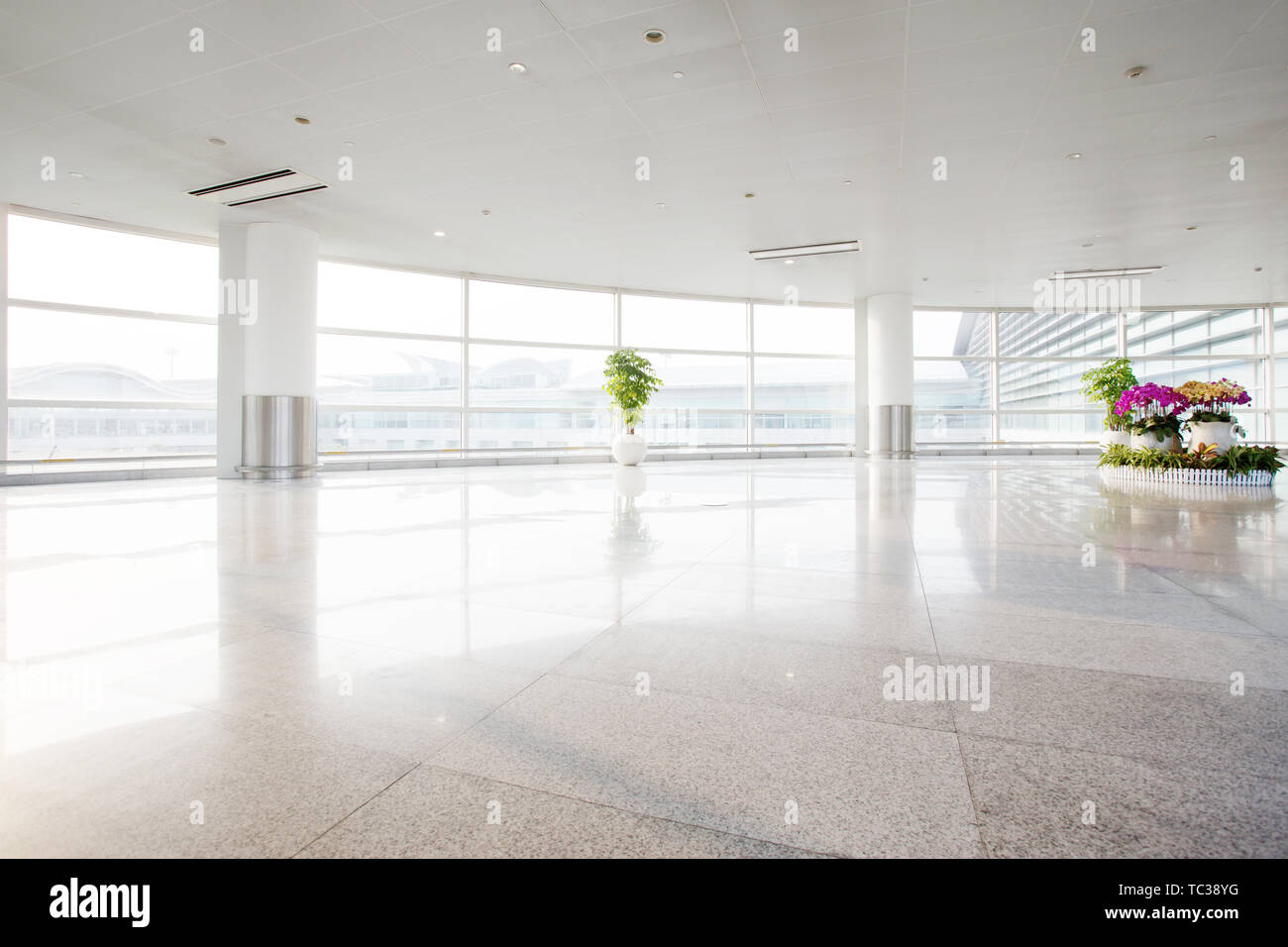 Large window into white office Stock Photo - Alamy