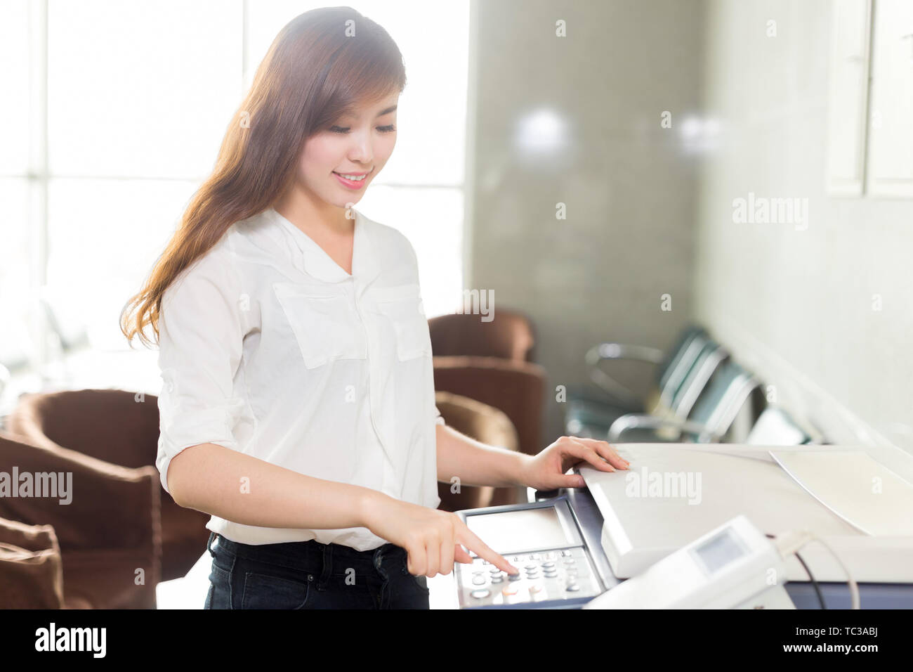 Woman photocopy machine hi-res stock photography and images - Alamy
