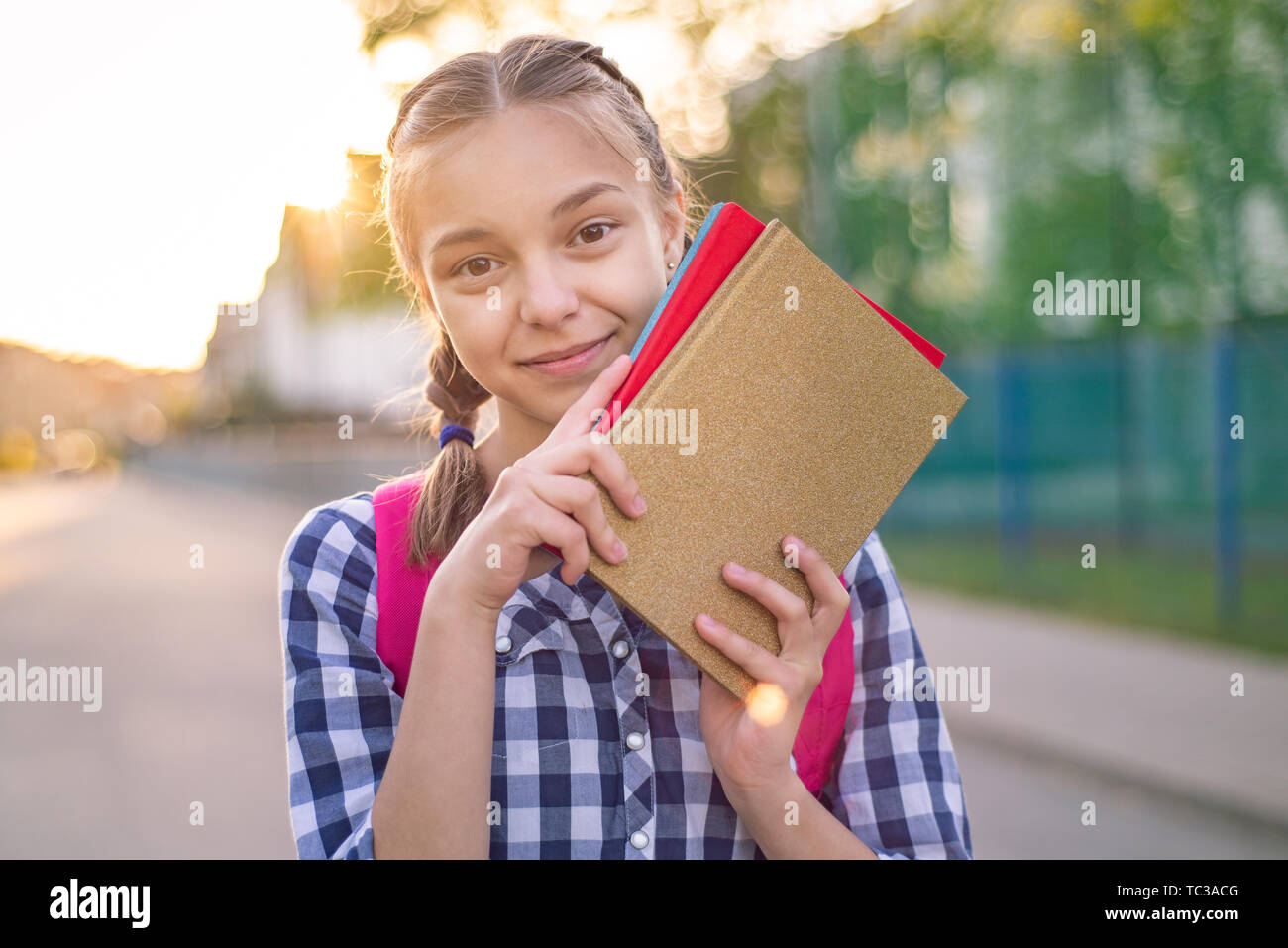 Portrait of teen girl with sun rays Stock Photo - Alamy