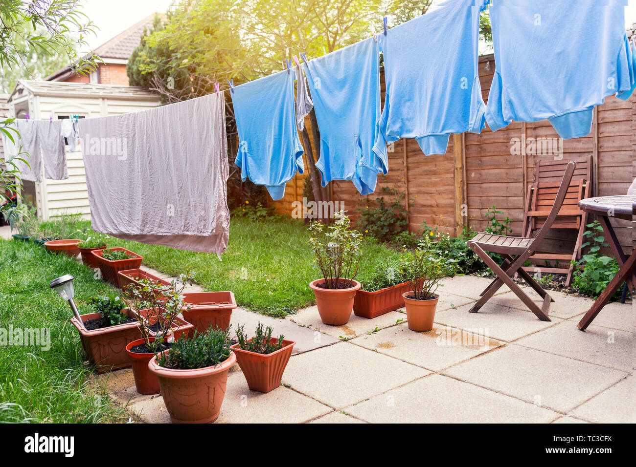 Laundry on washing lines. Drying laundry, Cloths are hanging on ...