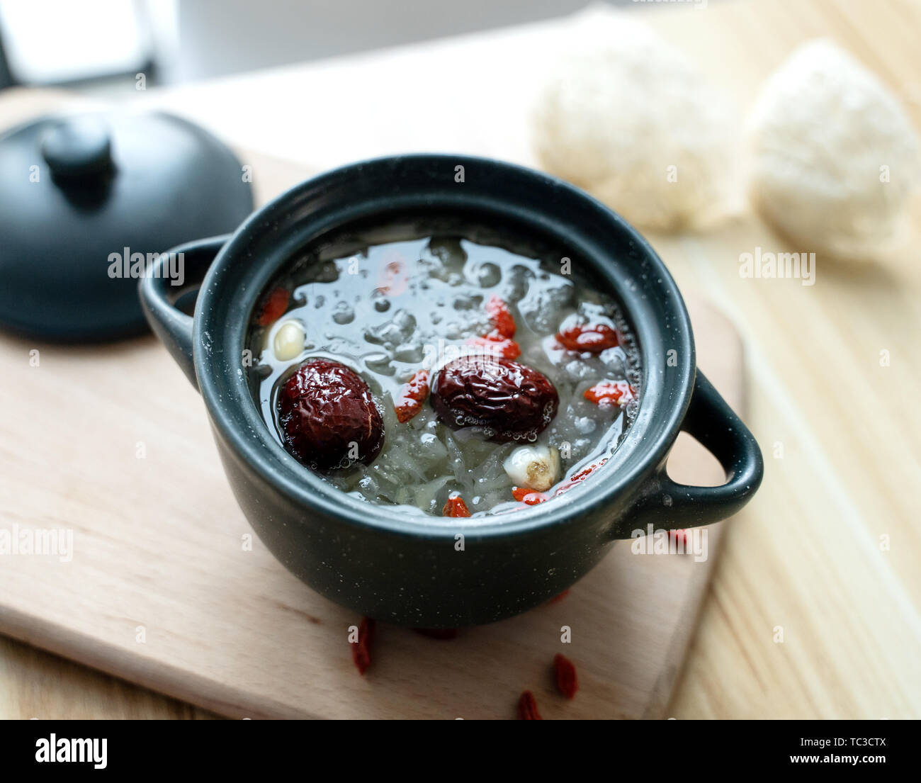 Red jujube silver ear lotus seed soup Stock Photo - Alamy