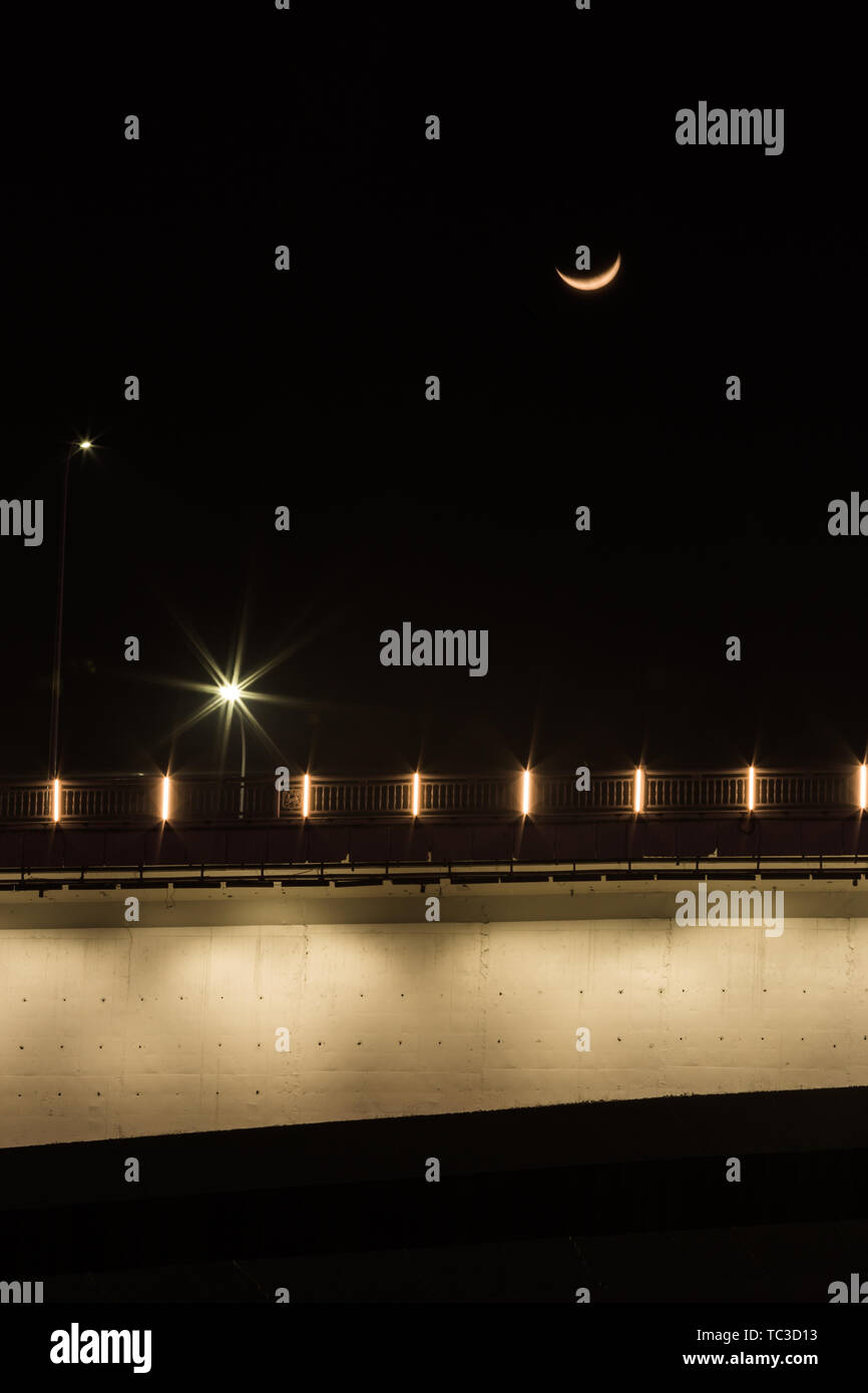 The curved moon in the yellow garden Stock Photo - Alamy