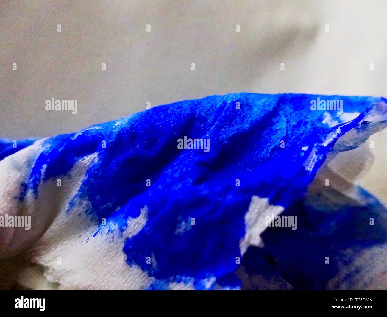 Blue-dyed paper towels Stock Photo - Alamy