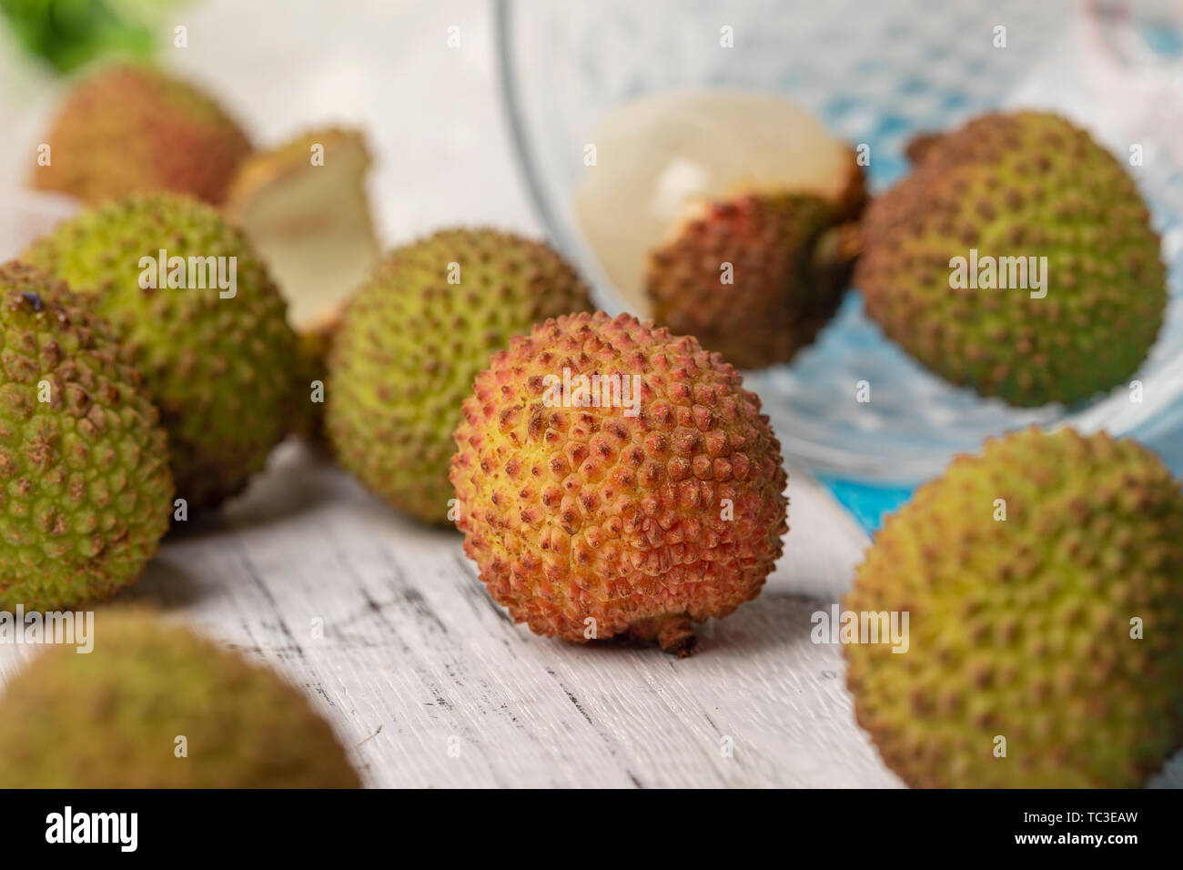 Fresh lychee on the table Stock Photo - Alamy