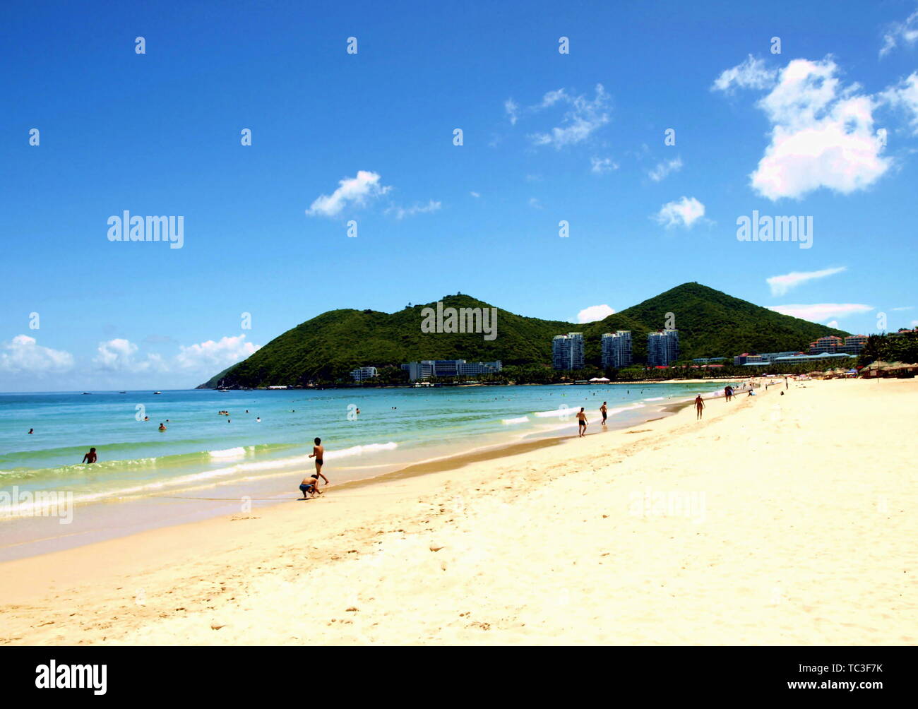 Hainan island beach surfing hi-res stock photography and images - Alamy