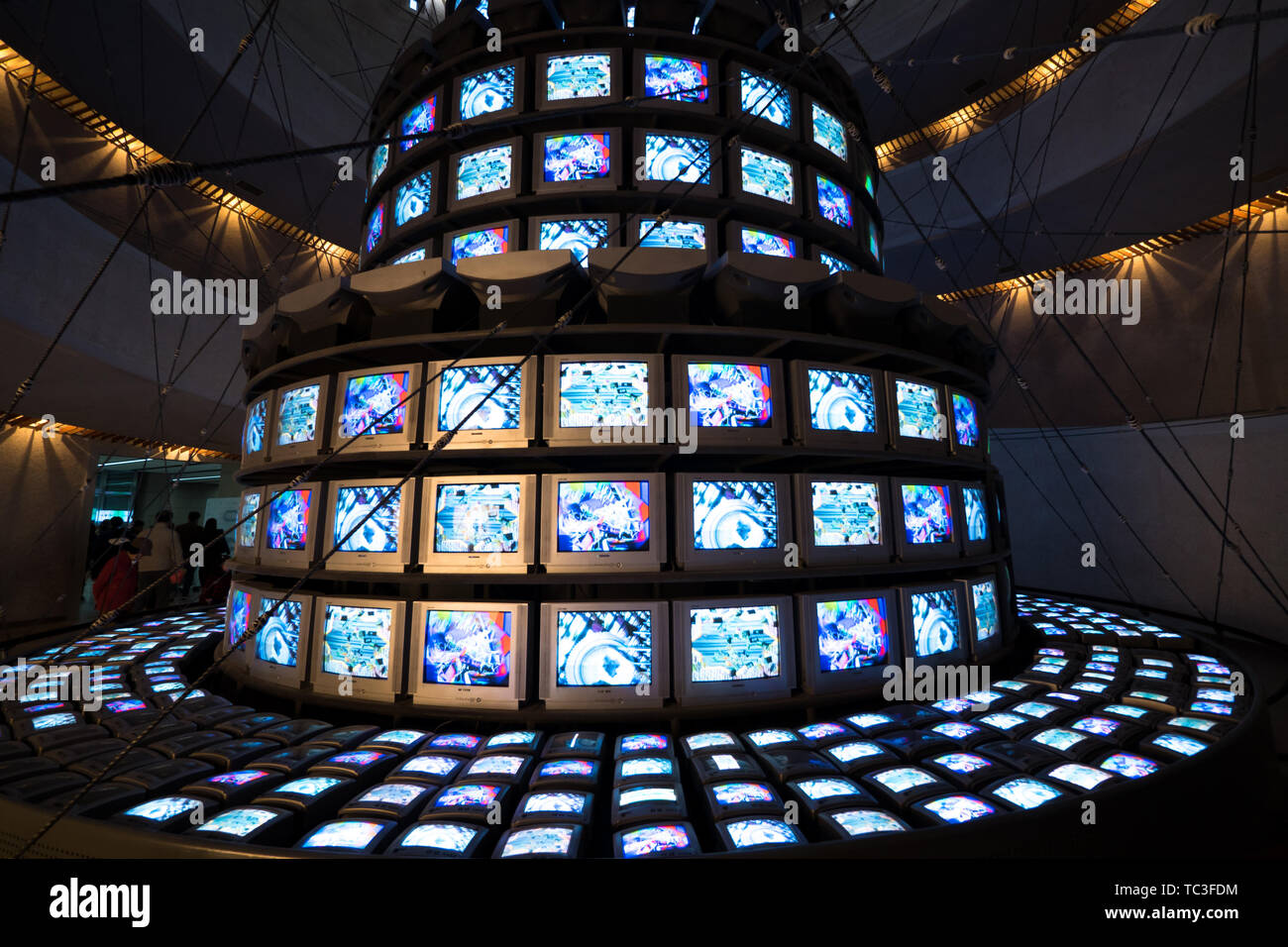 tower style architecture with illuminated displays Stock Photo - Alamy