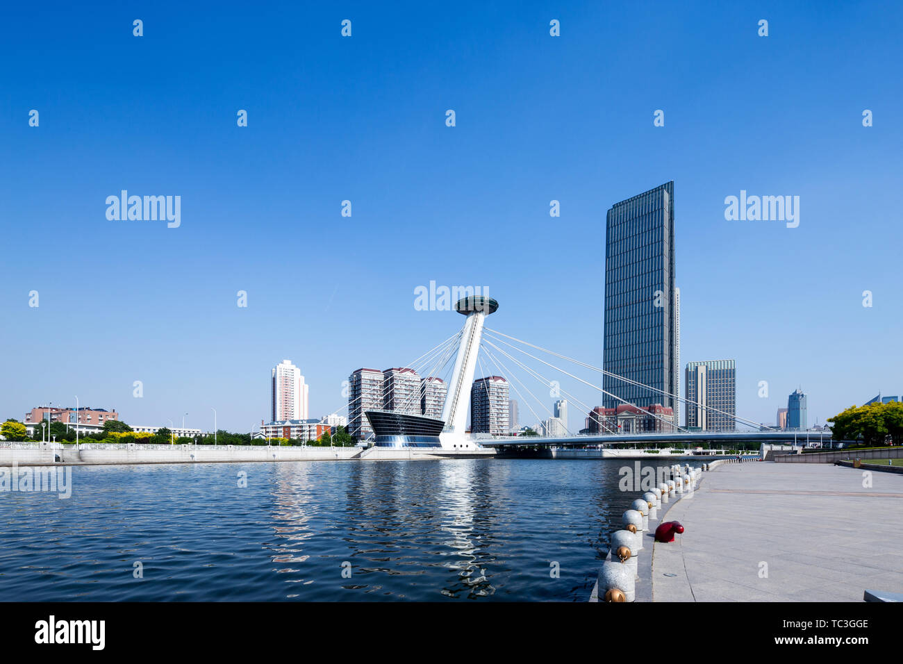 modern buildings in urban city at riverbank Stock Photo - Alamy
