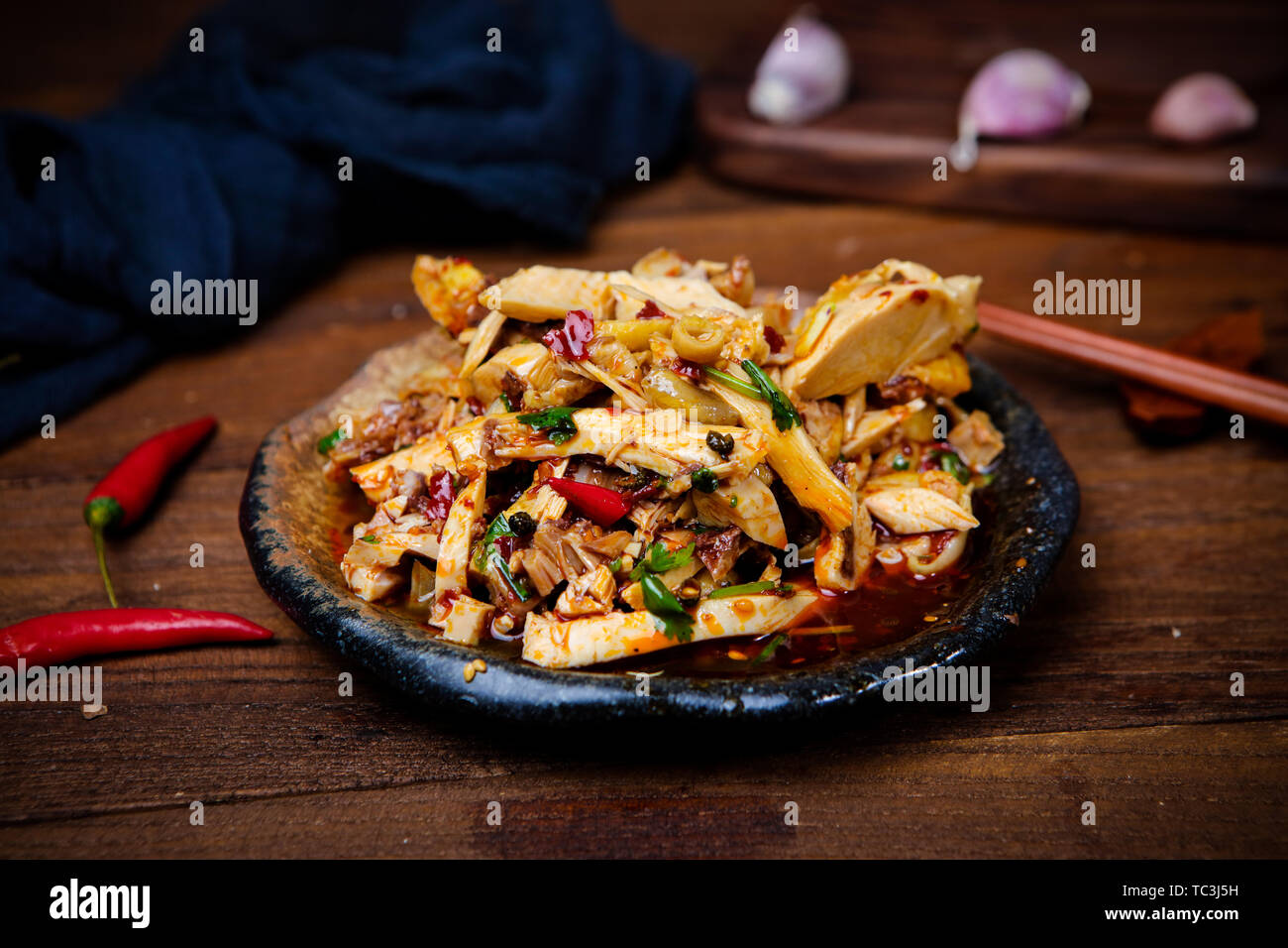 drooling chicken, stick chicken Stock Photo - Alamy