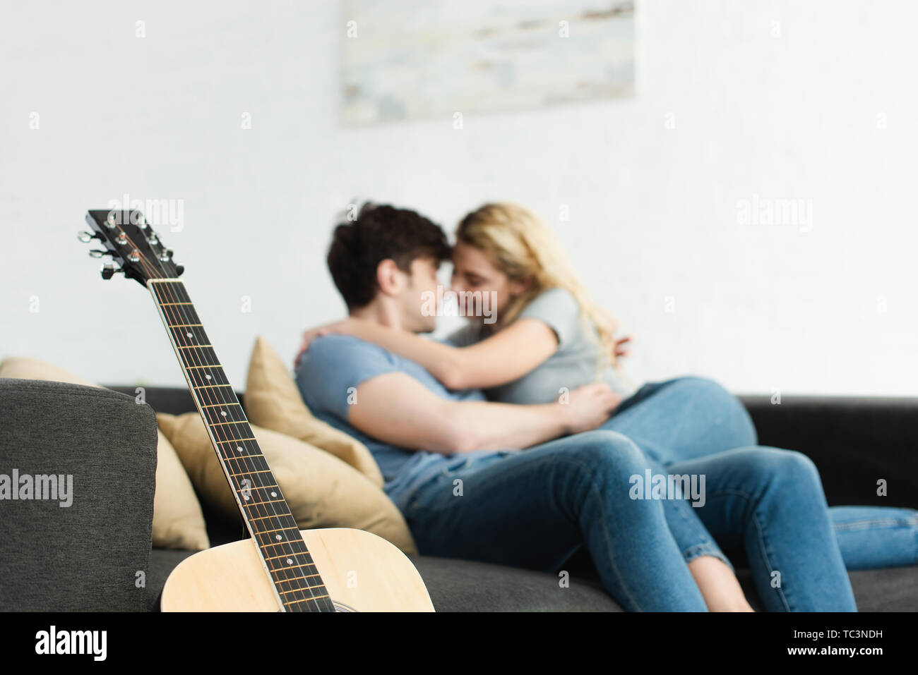 Hugging Guitar High Resolution Stock Photography and Images - Alamy