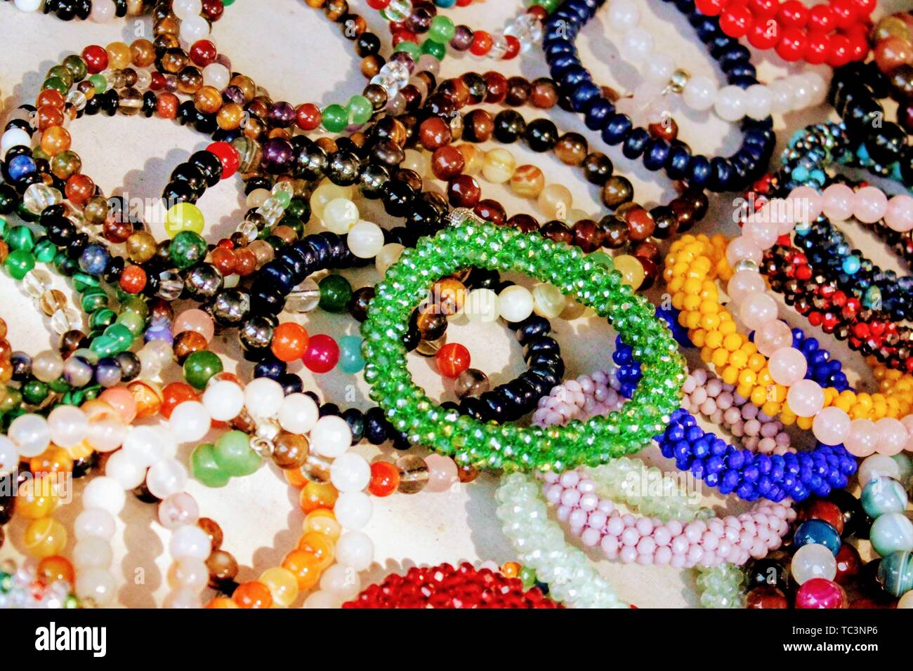 Beautiful bracelet of crystal ball in beautiful colors Stock Photo - Alamy