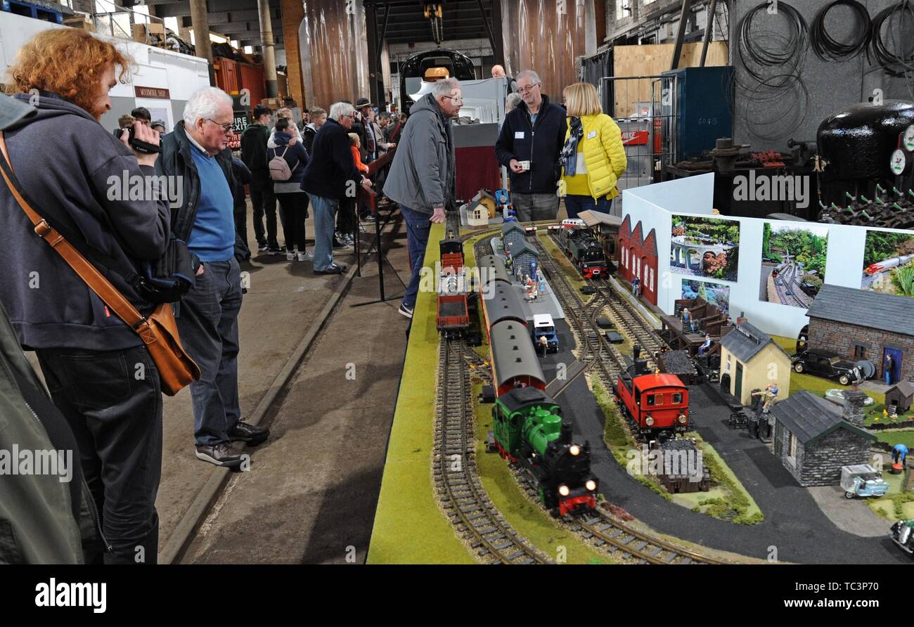 People watching a model railway display at Kidderminster station on the ...