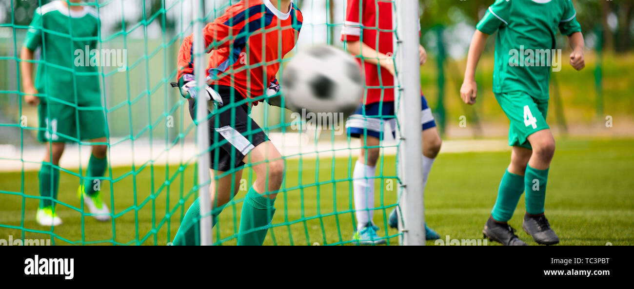 Kid saving goal football hi-res stock photography and images - Alamy