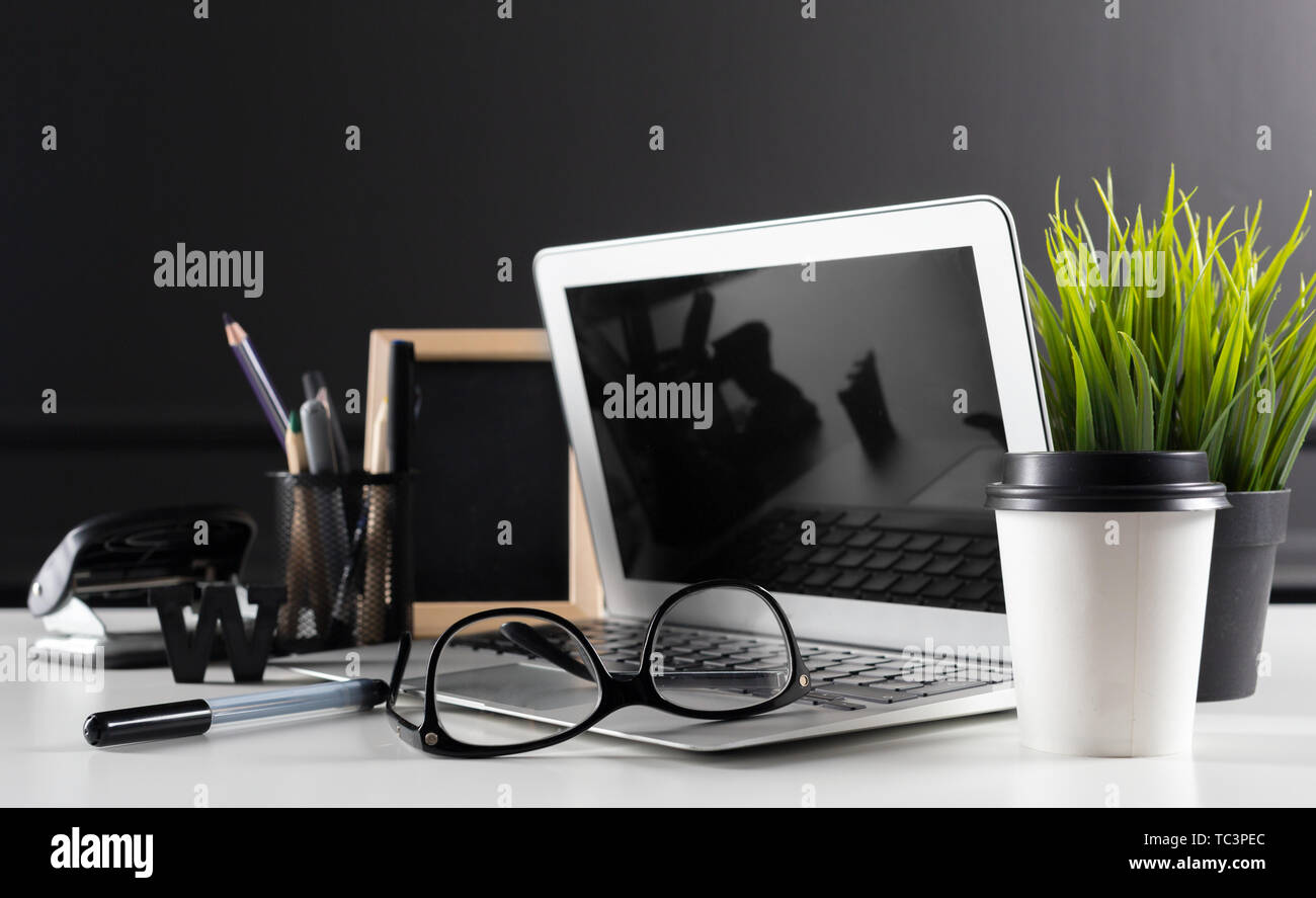 Office leather desk table with computer, supplies Stock Photo - Alamy