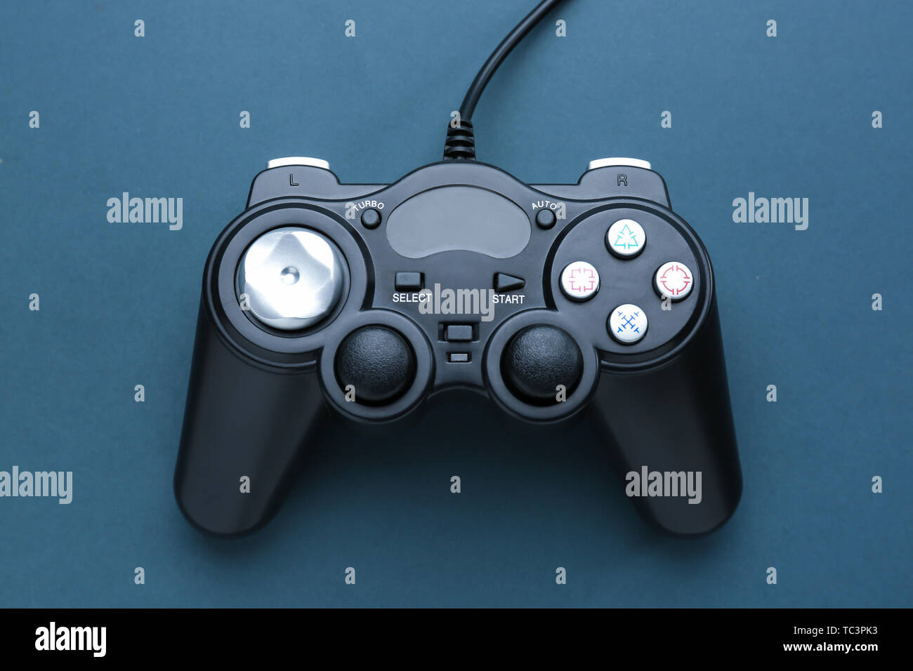 Modern game pad on grey background Stock Photo - Alamy