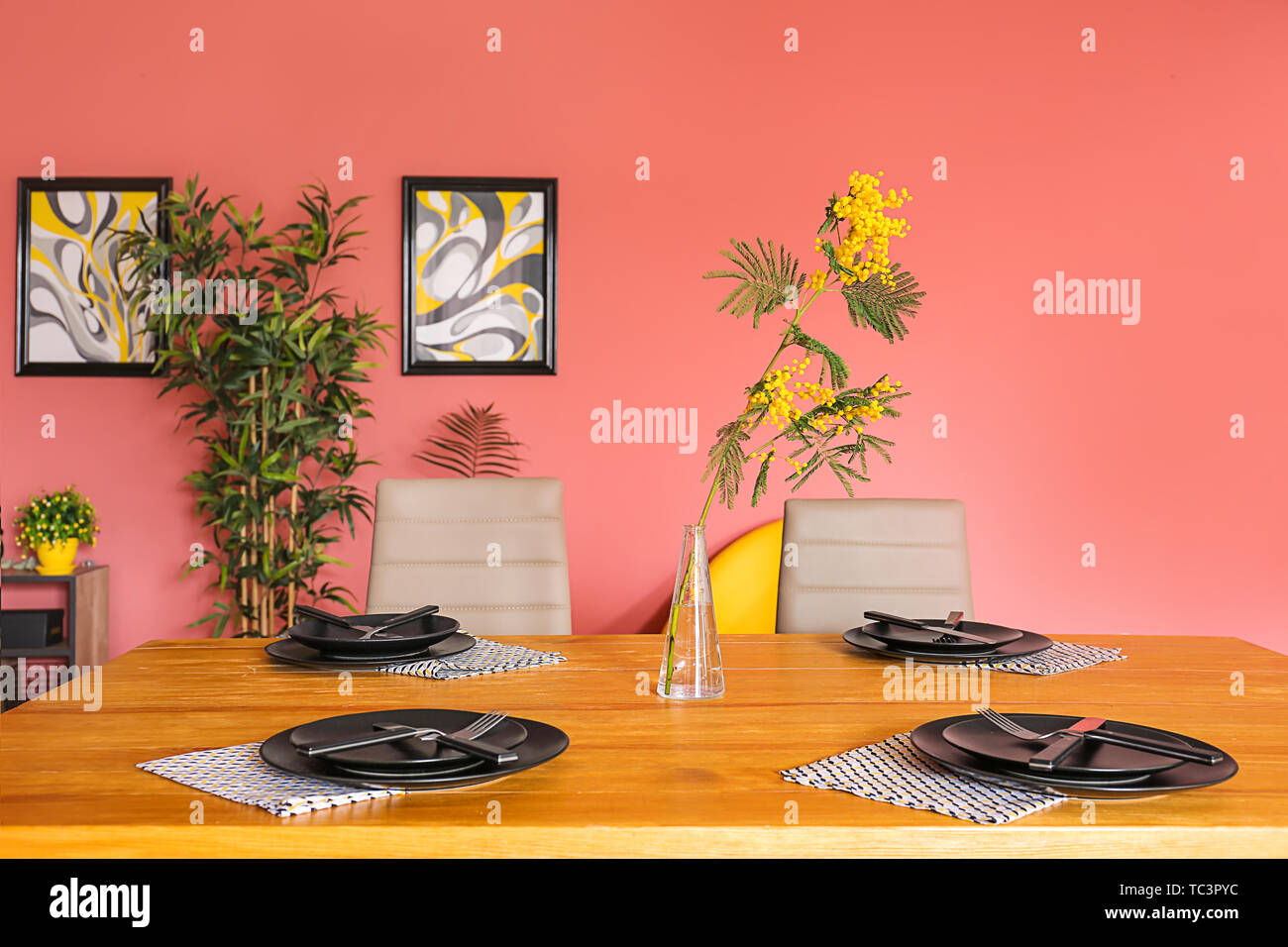 Table served for dinner in dining room Stock Photo - Alamy
