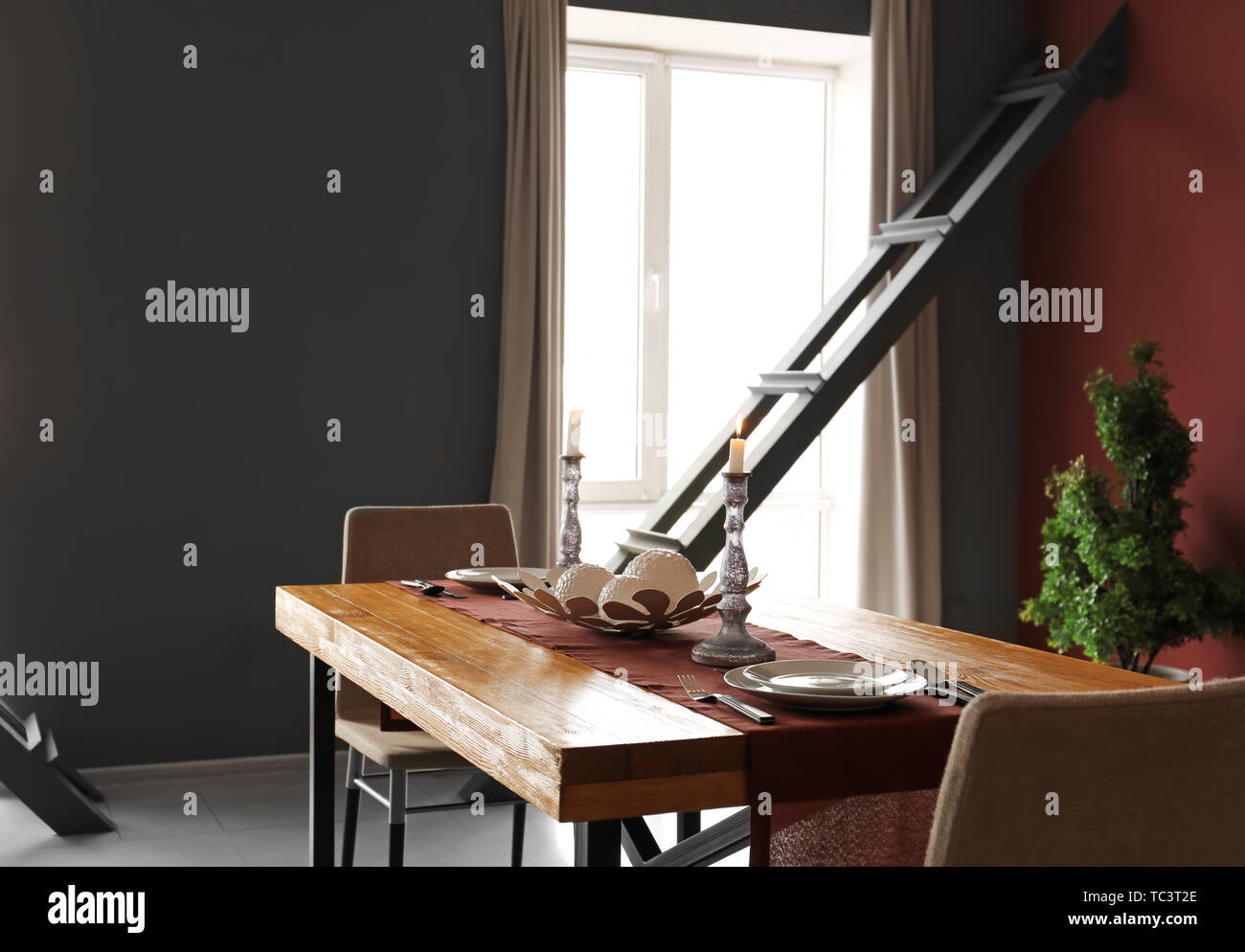 Table served for dinner in dining room Stock Photo - Alamy